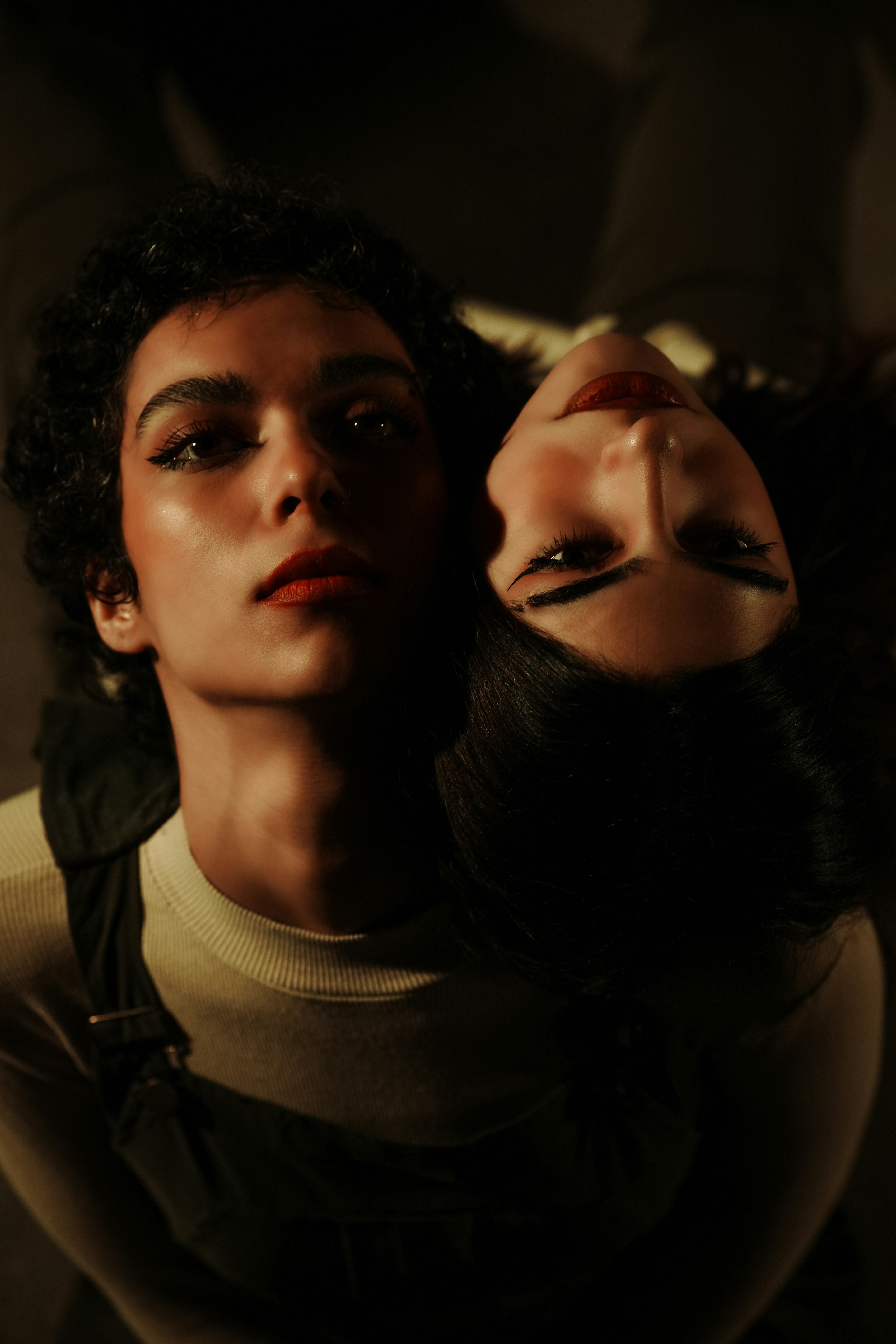 Two people look up at the camera together. photo – Free Portrait Image ...