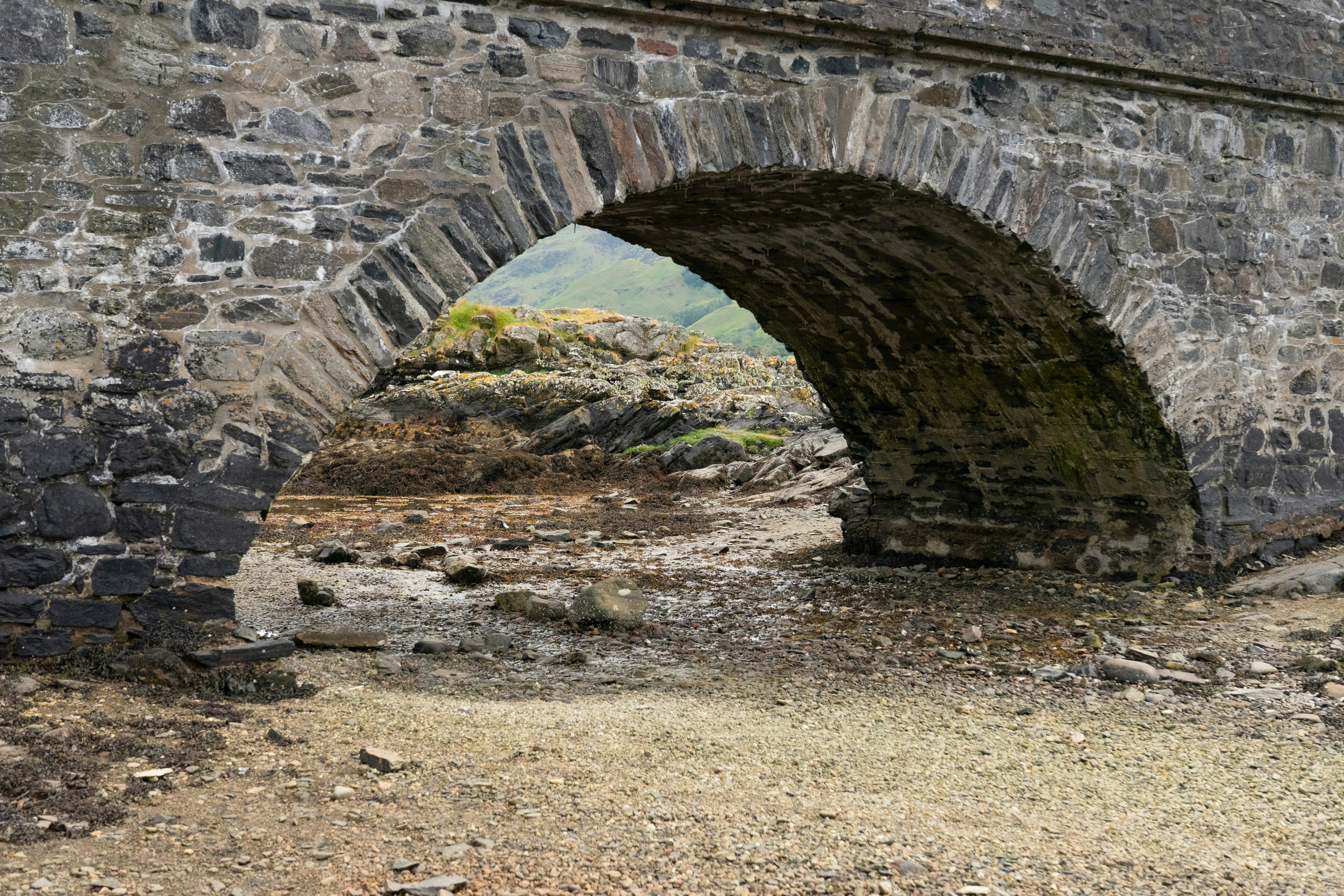 A stone bridge with an arch.