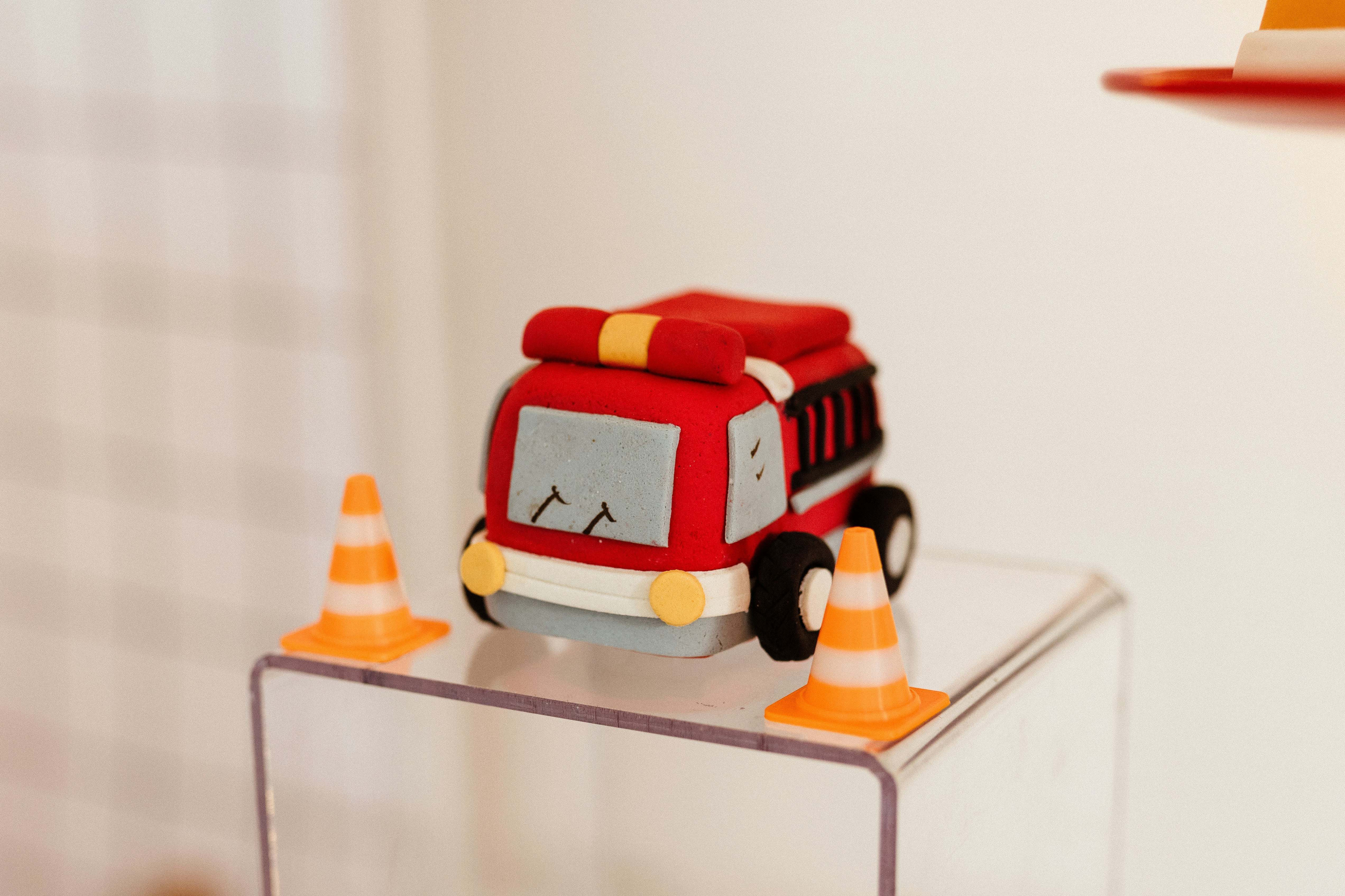 Mini Fire Engine on a Glass Pedestal