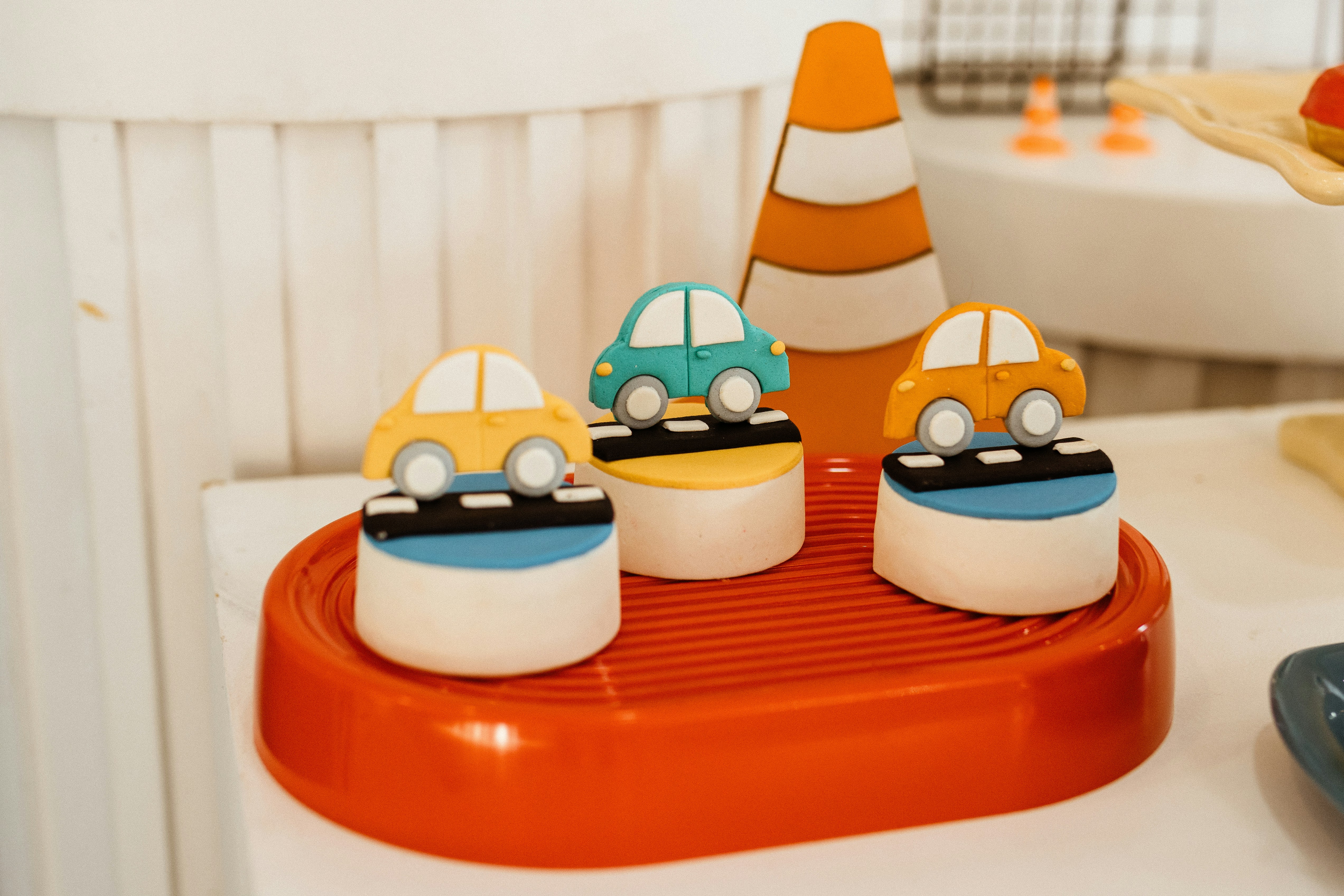 Miniature Car Parade on a Traffic-Cone Stage