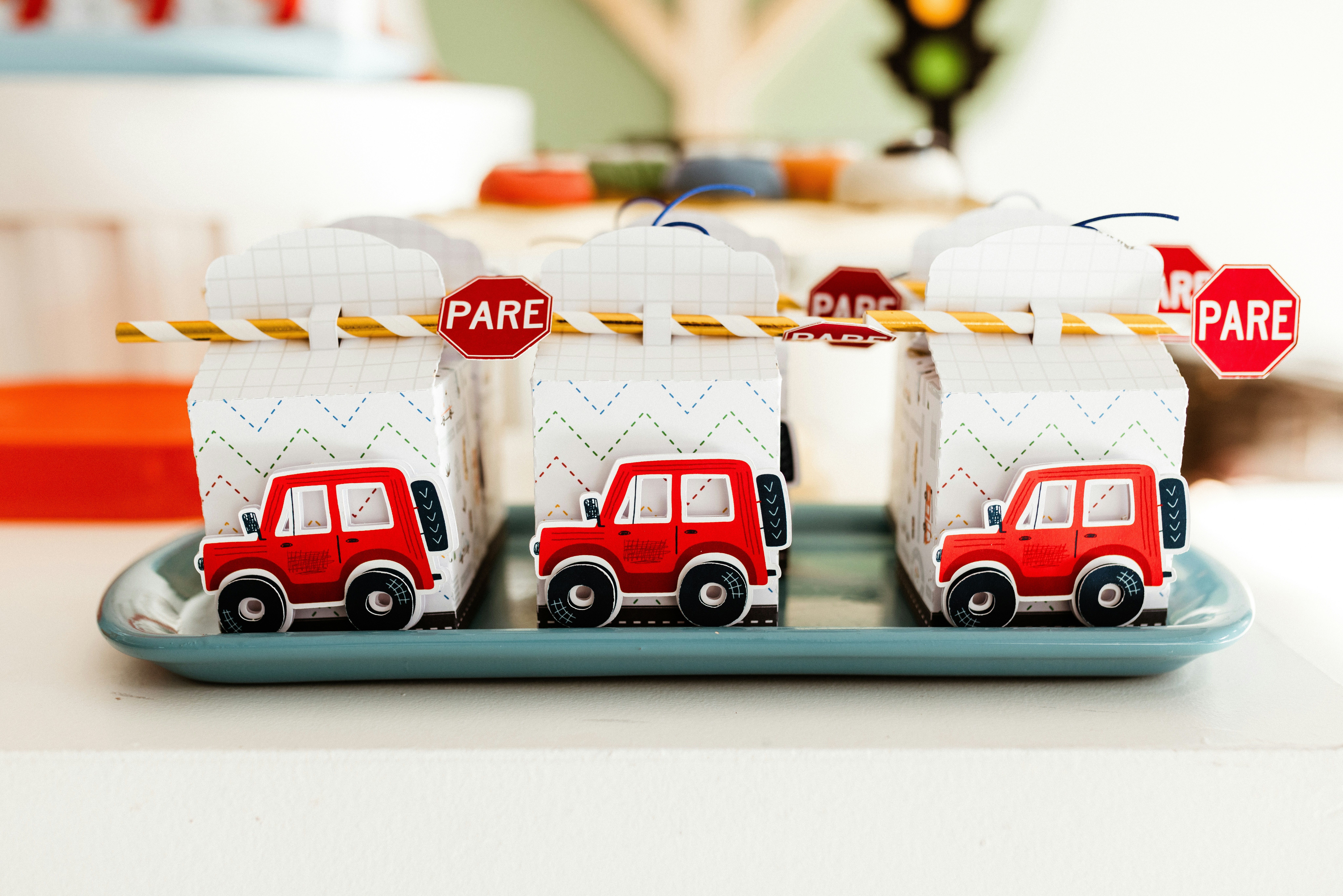 Candy-lined Stop Signs: Mini Cars Guard Delicate Desserts