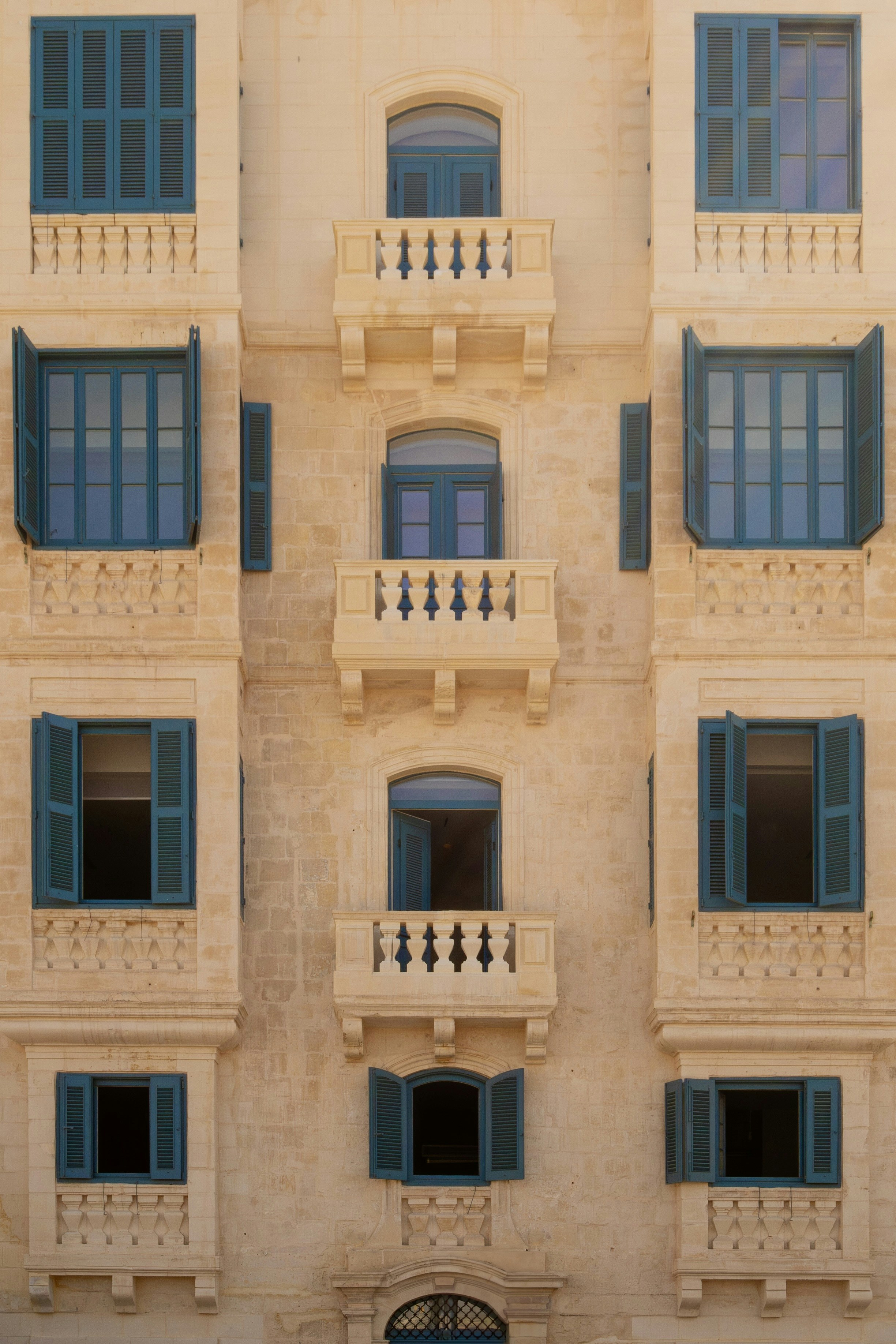 Building facade with open windows and balconies. photo – Free ...