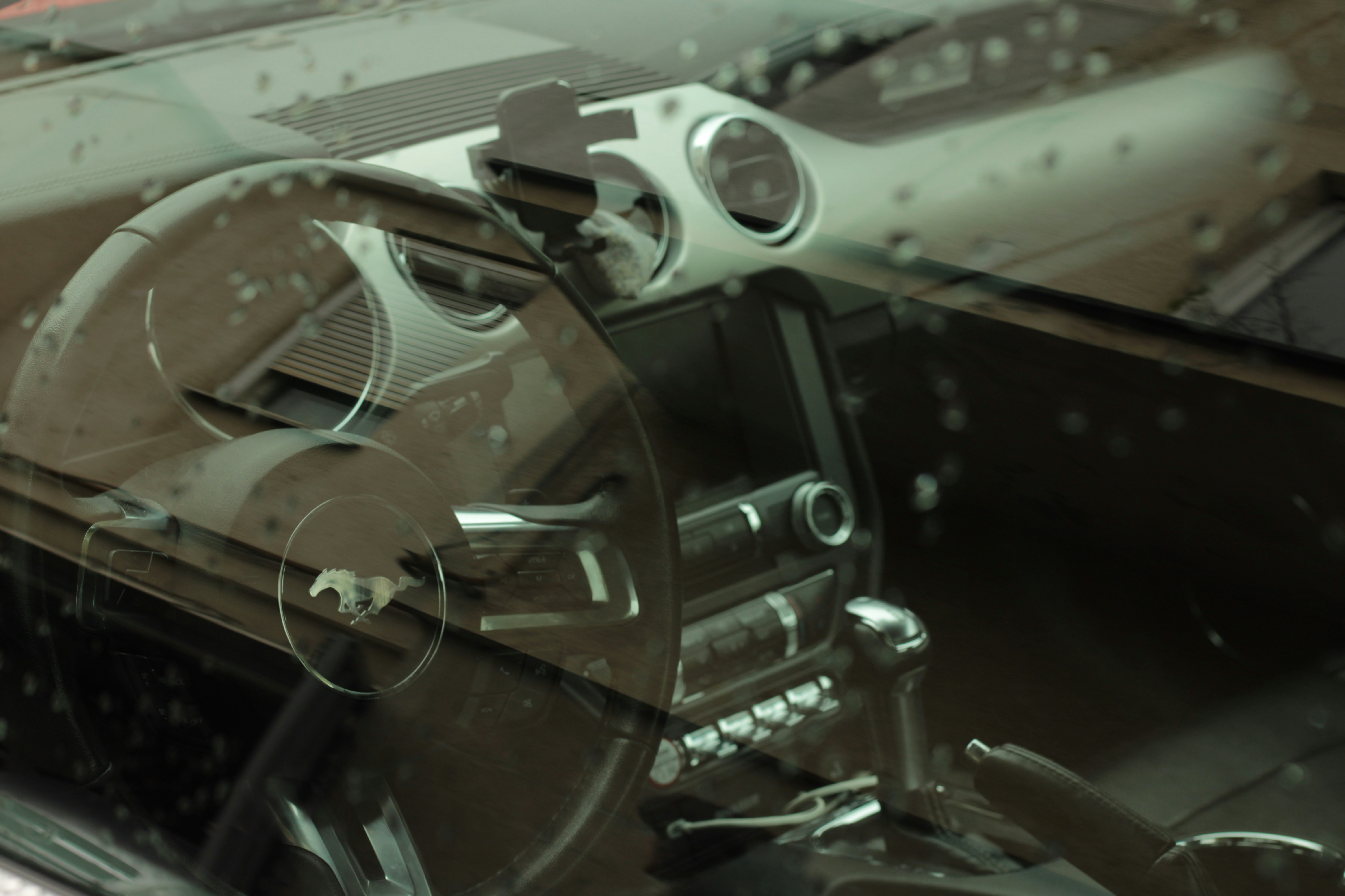 The interior of a car, showing the dashboard.