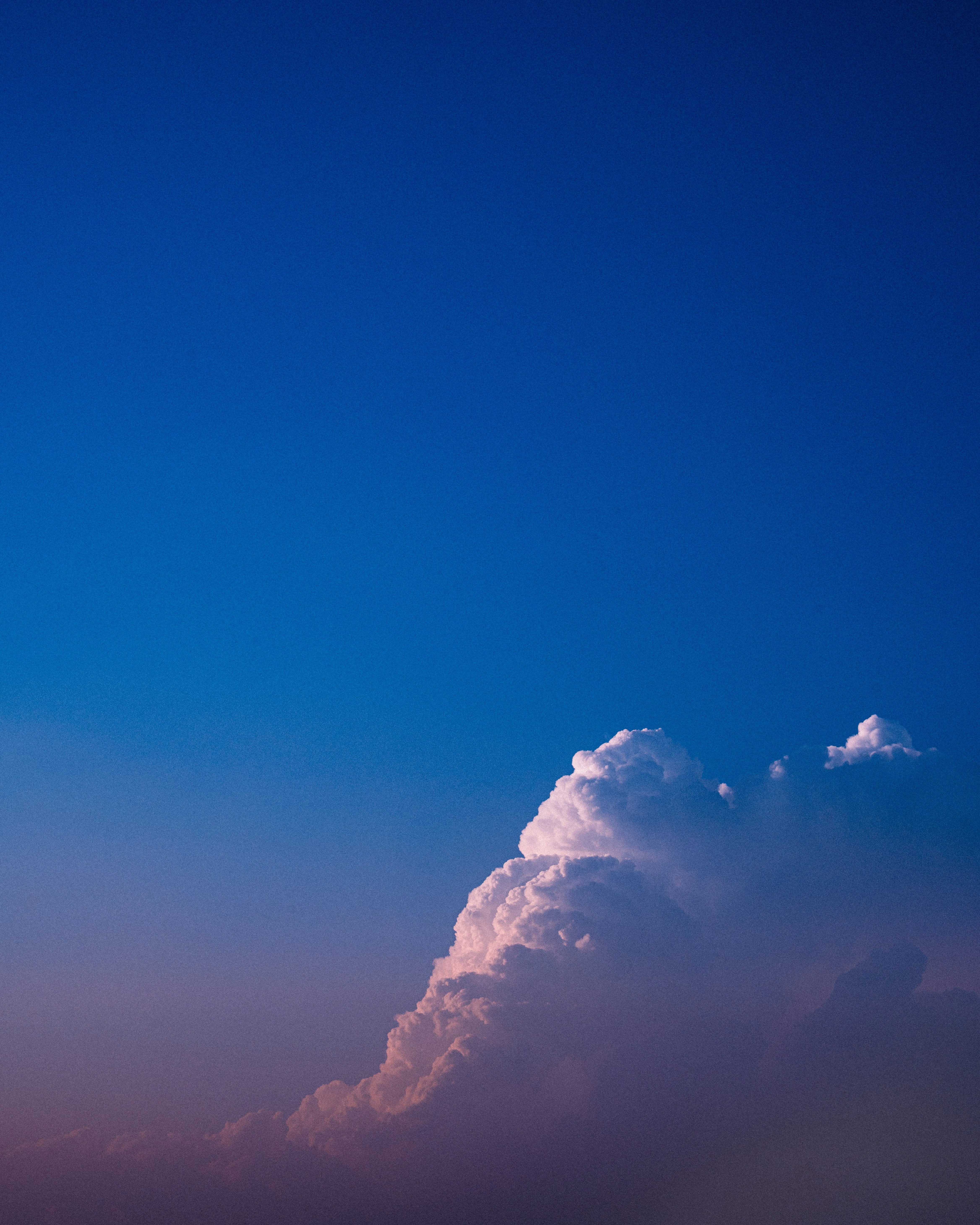 Velvet Dusk over a Towering Cumulus: Gradient Sky Portrait