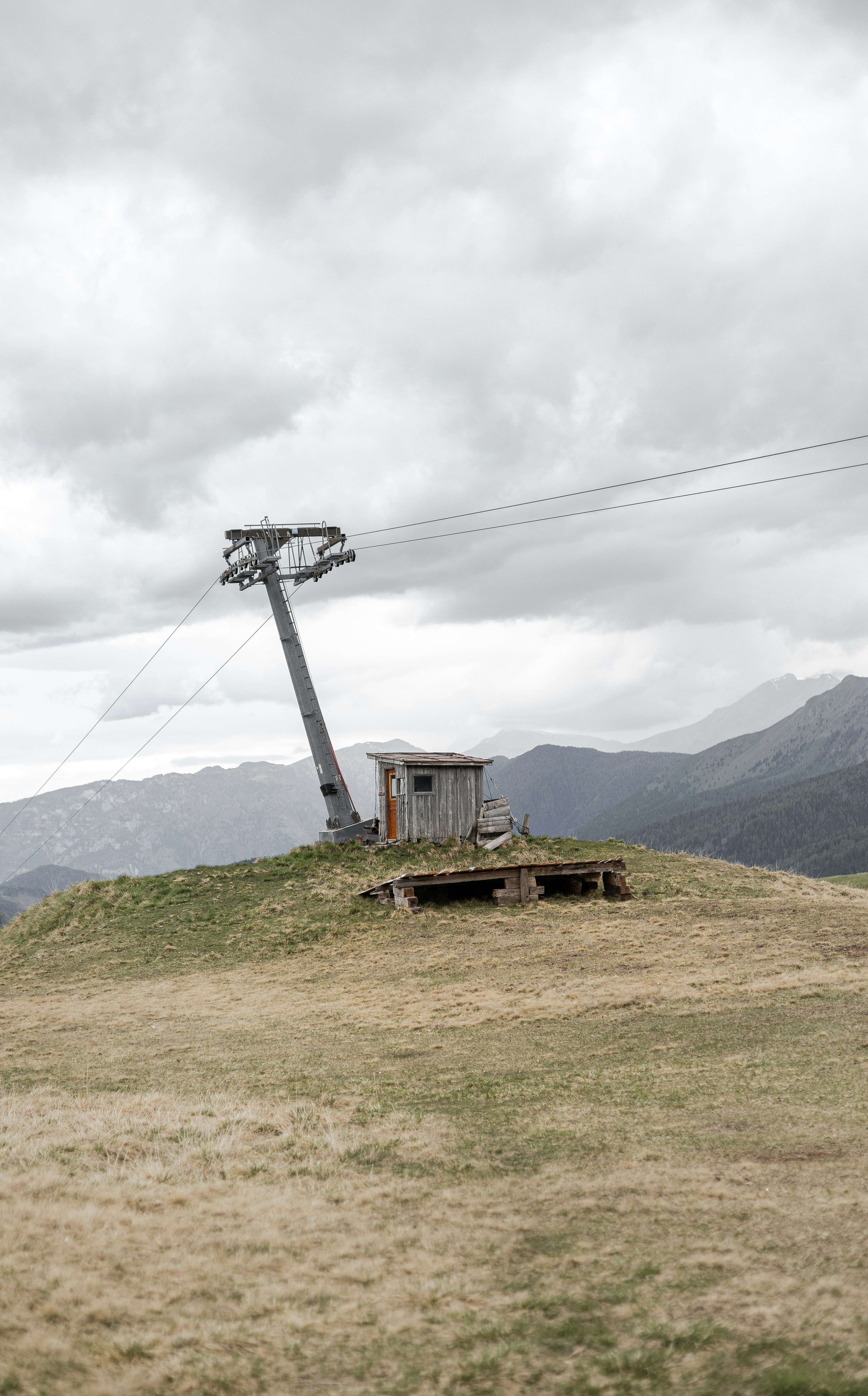 An old ski lift and shack in the mountains. photo – Free Travel Image ...