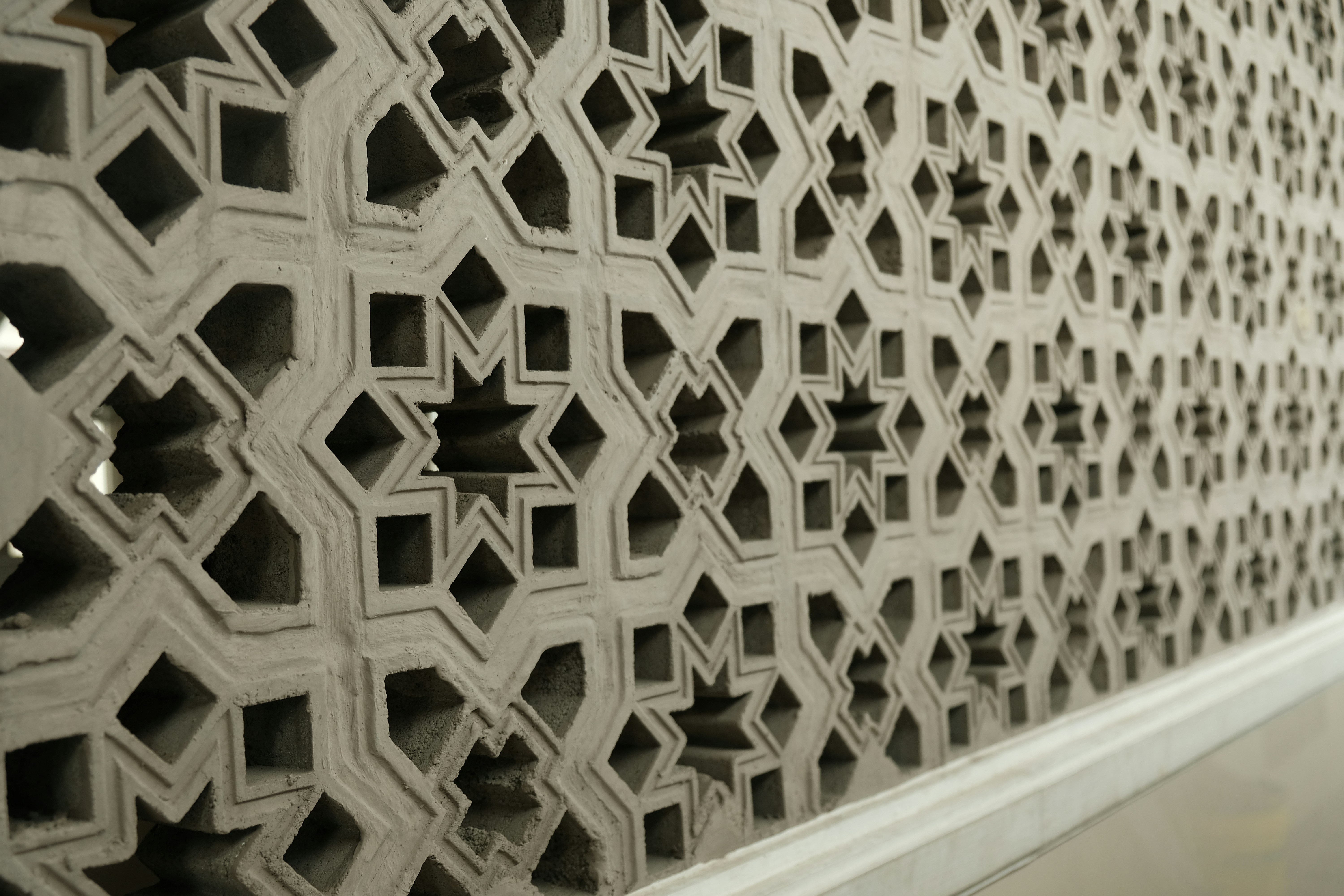 Intricate geometric pattern in a wall.