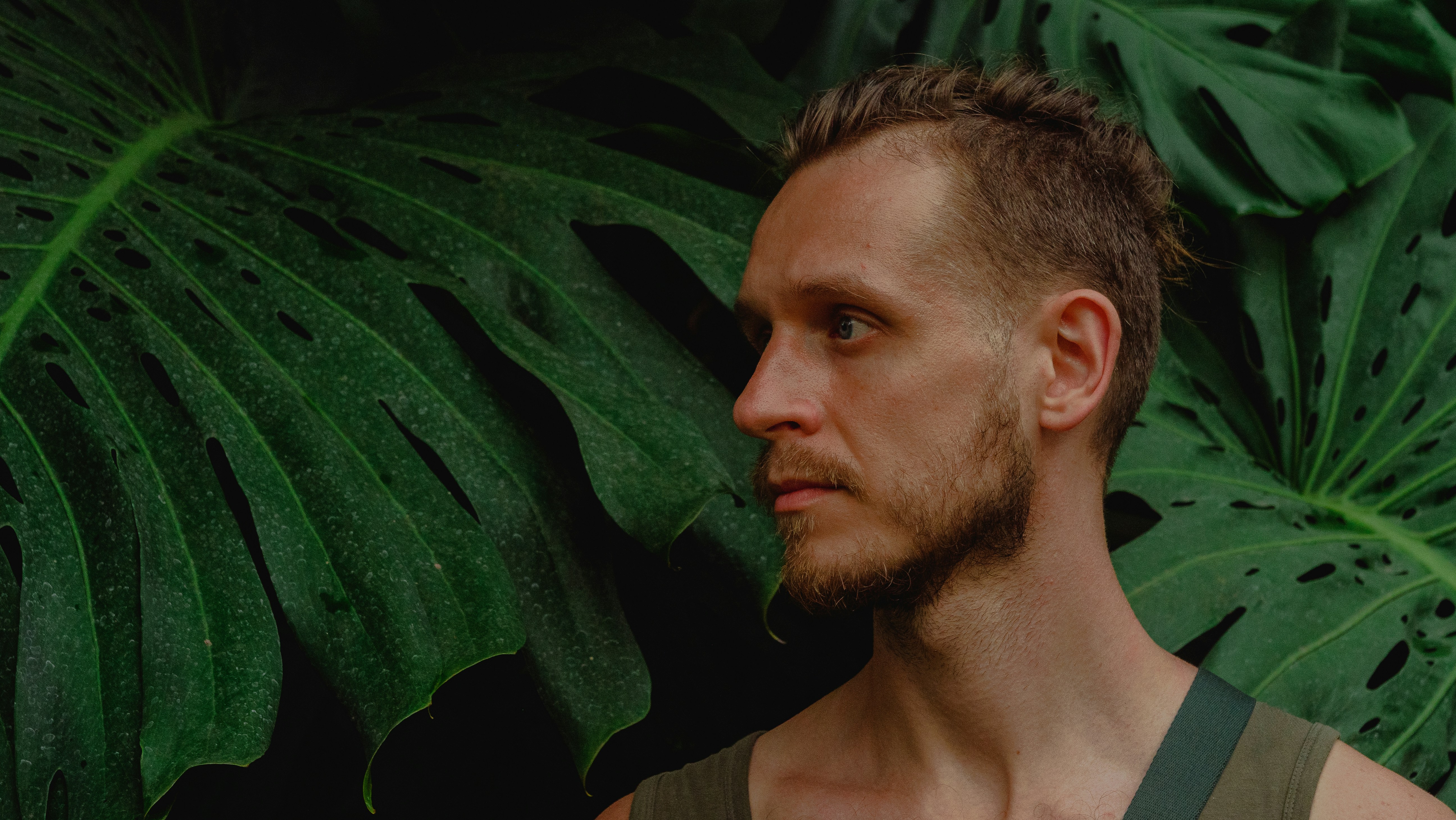 Profile Portrait Amid Monstera Shadows
