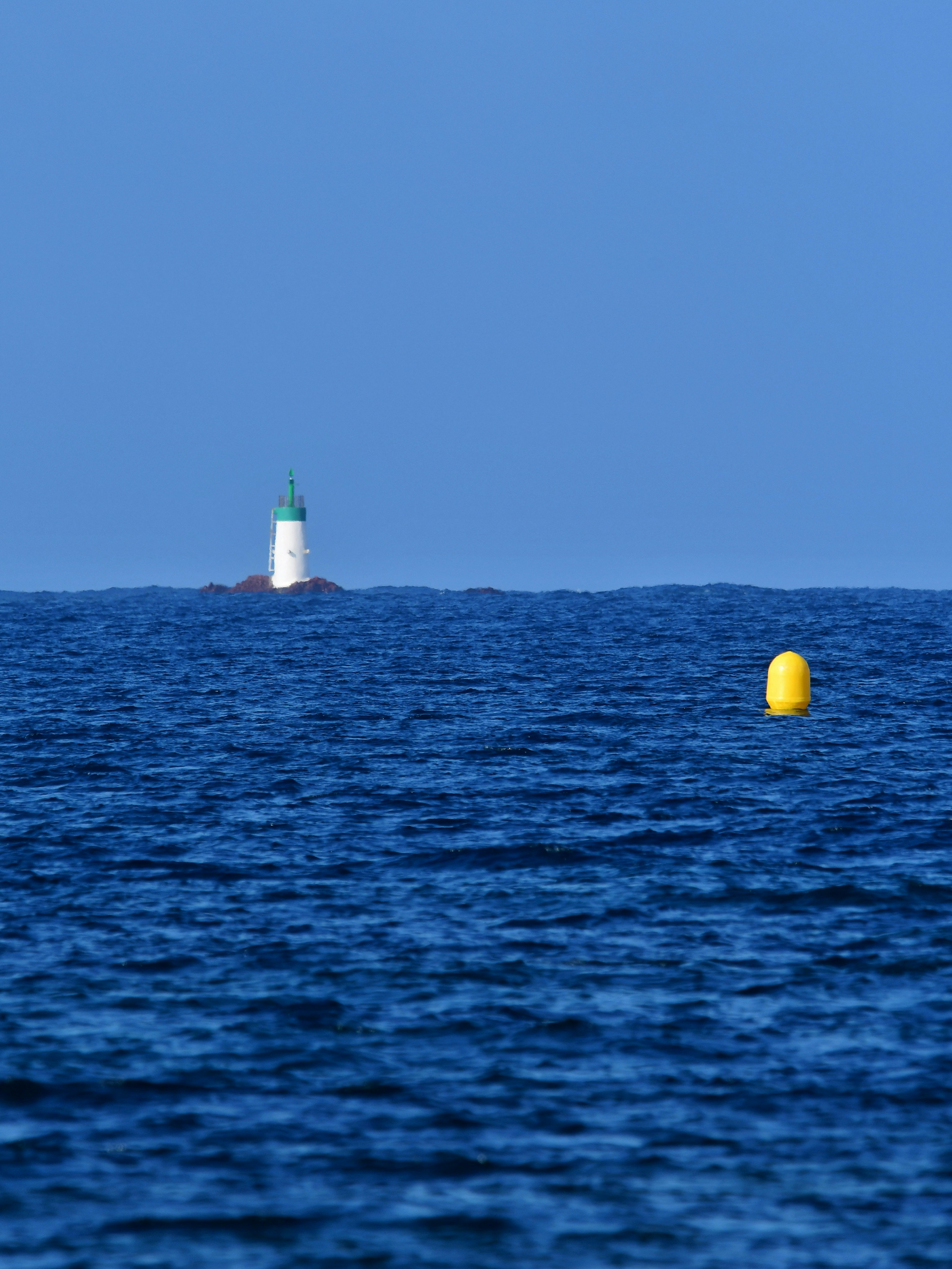 Beacon of Solitude: A Lighthouse Amidst the Waves