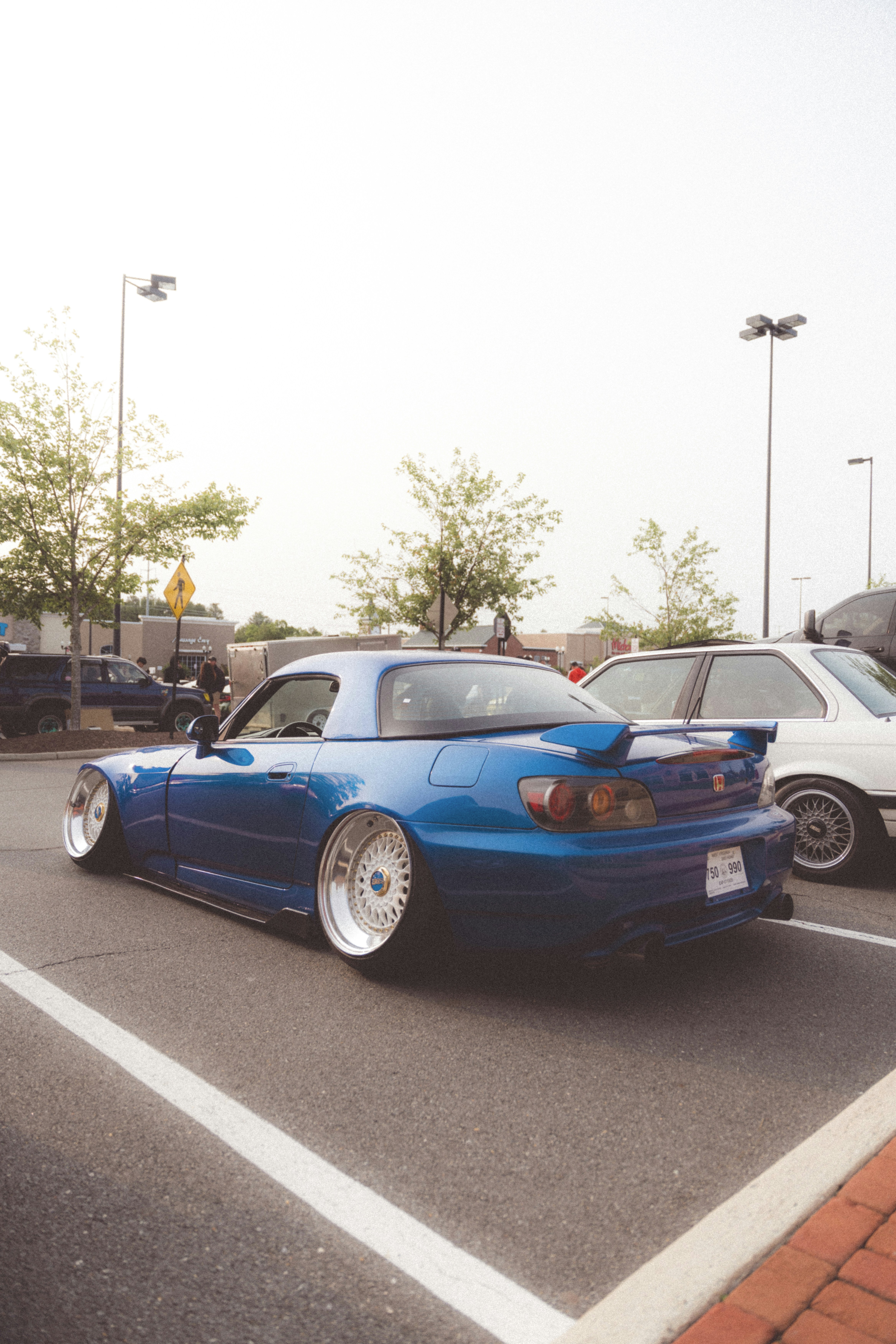 A blue honda s2000 with a wing is shown. photo – Free Film Image on ...
