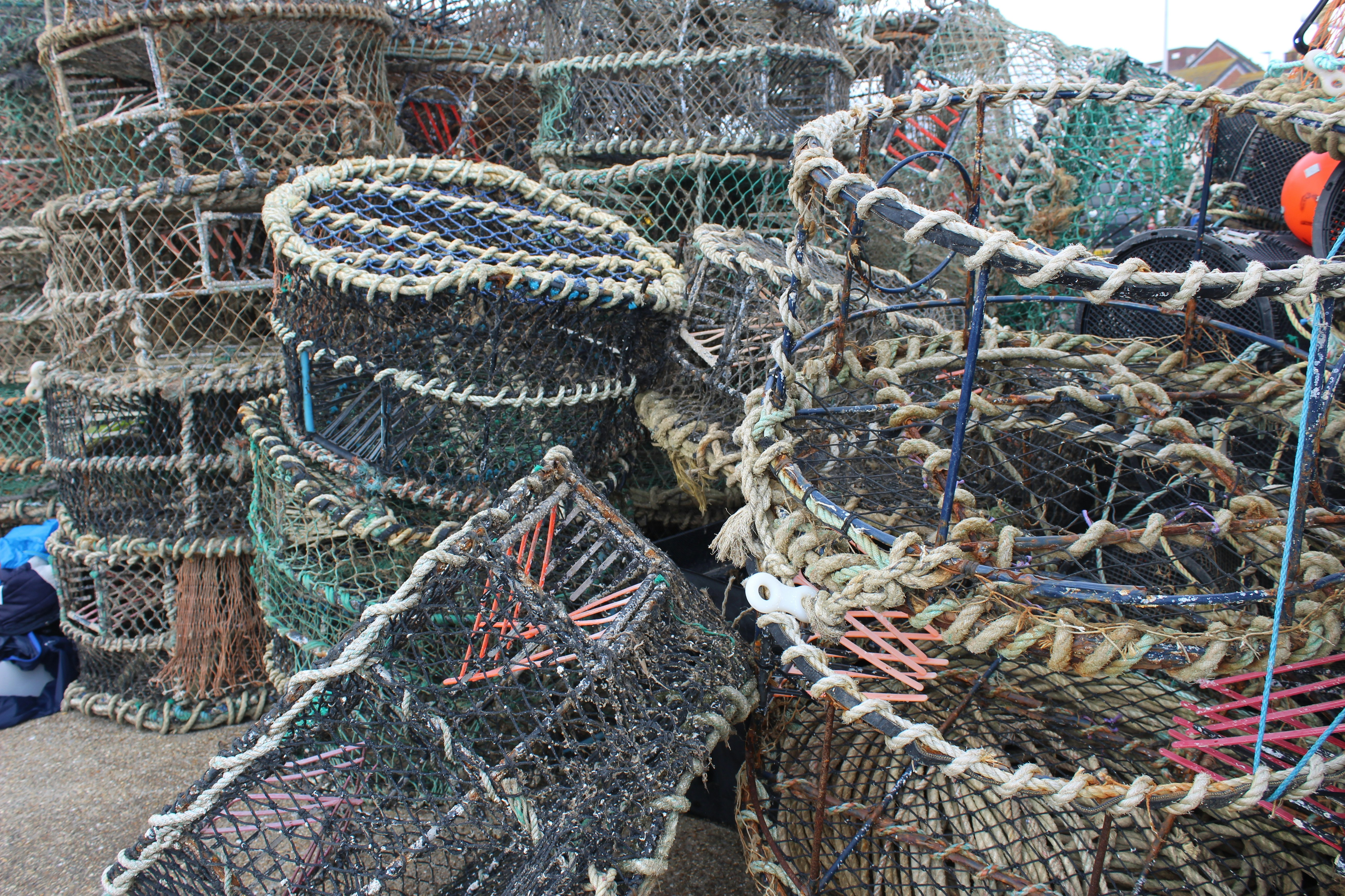 Lobster traps are piled up ready to be used
