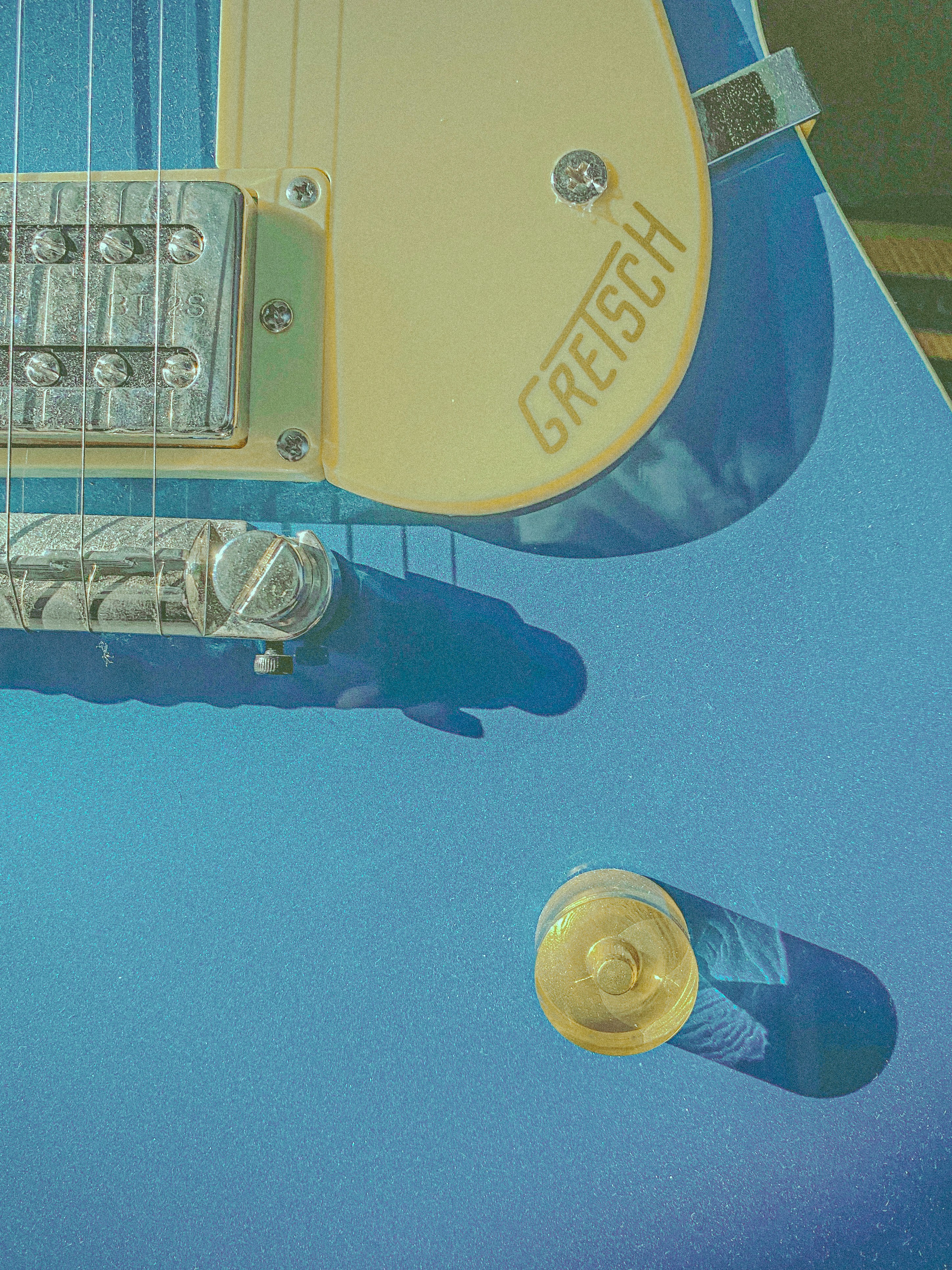 A close-up view of a blue gretsch guitar. photo – Free Guitar Image on ...