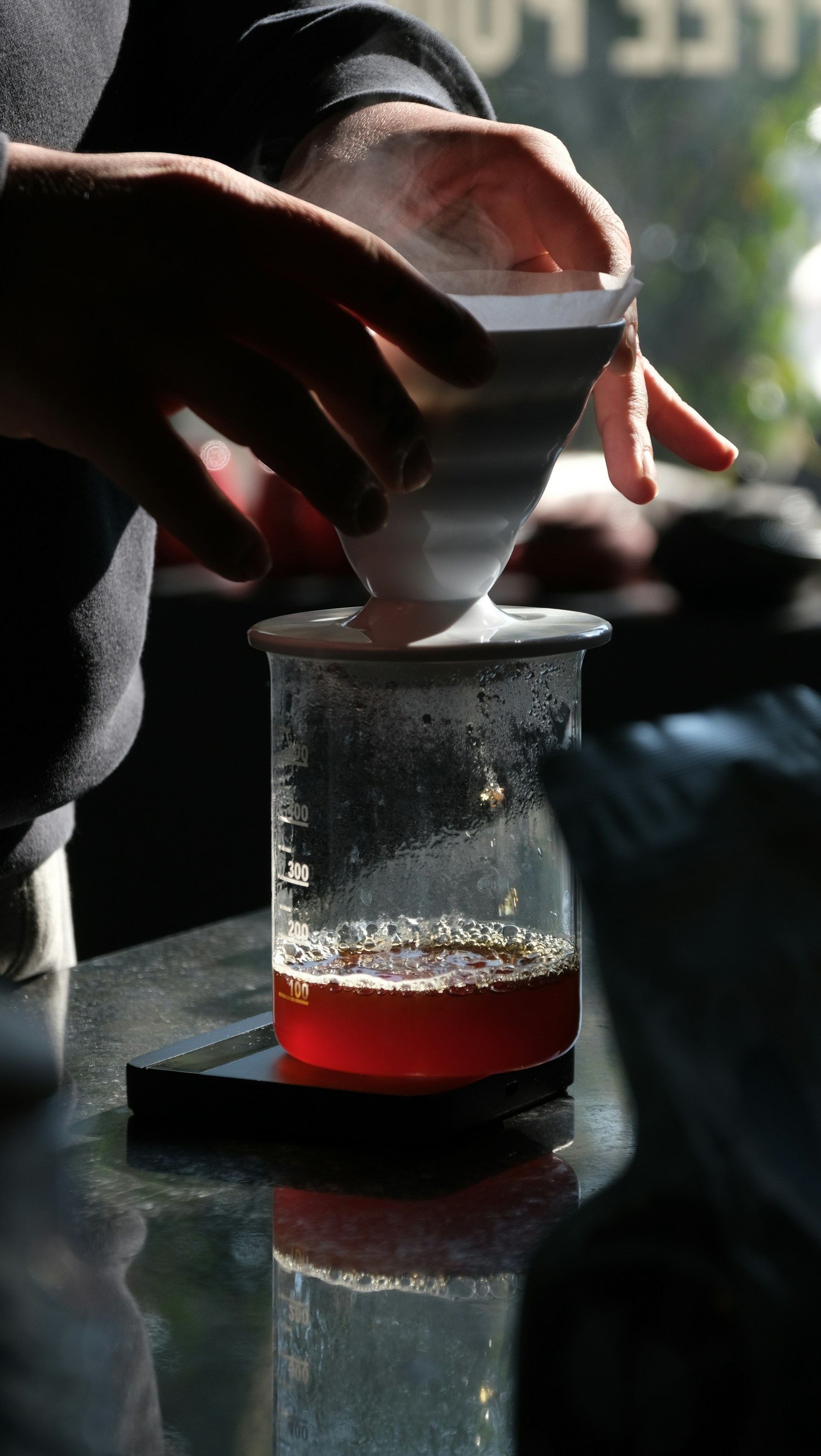 Coffee is being prepared using a pour over method. photo – Free Minimal ...