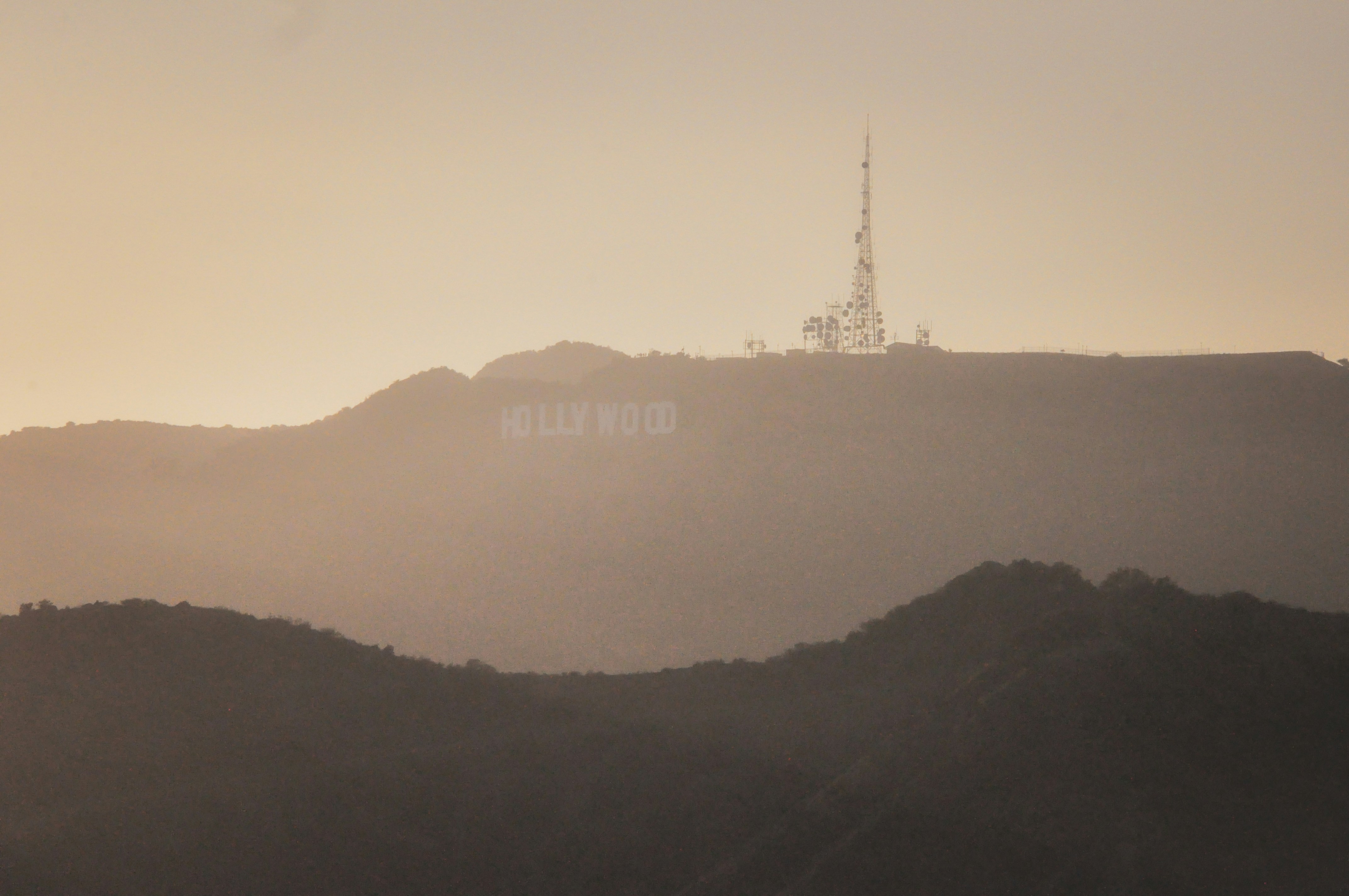 Echoes of Sunrise: Hollywood Sign Quietly Emerges Through Mist
