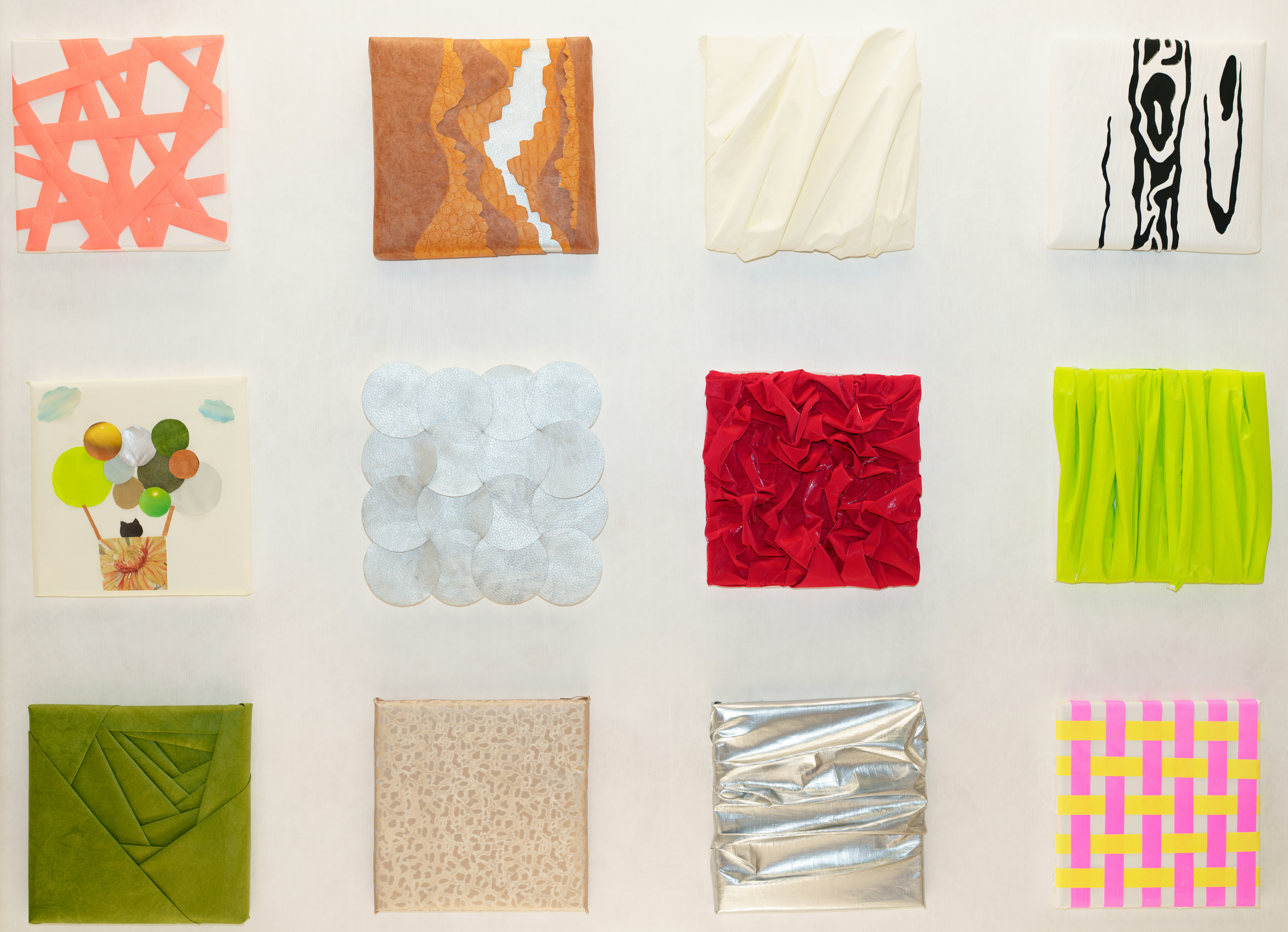 Twelve abstract textured squares arranged on a wall. photo – Free ...