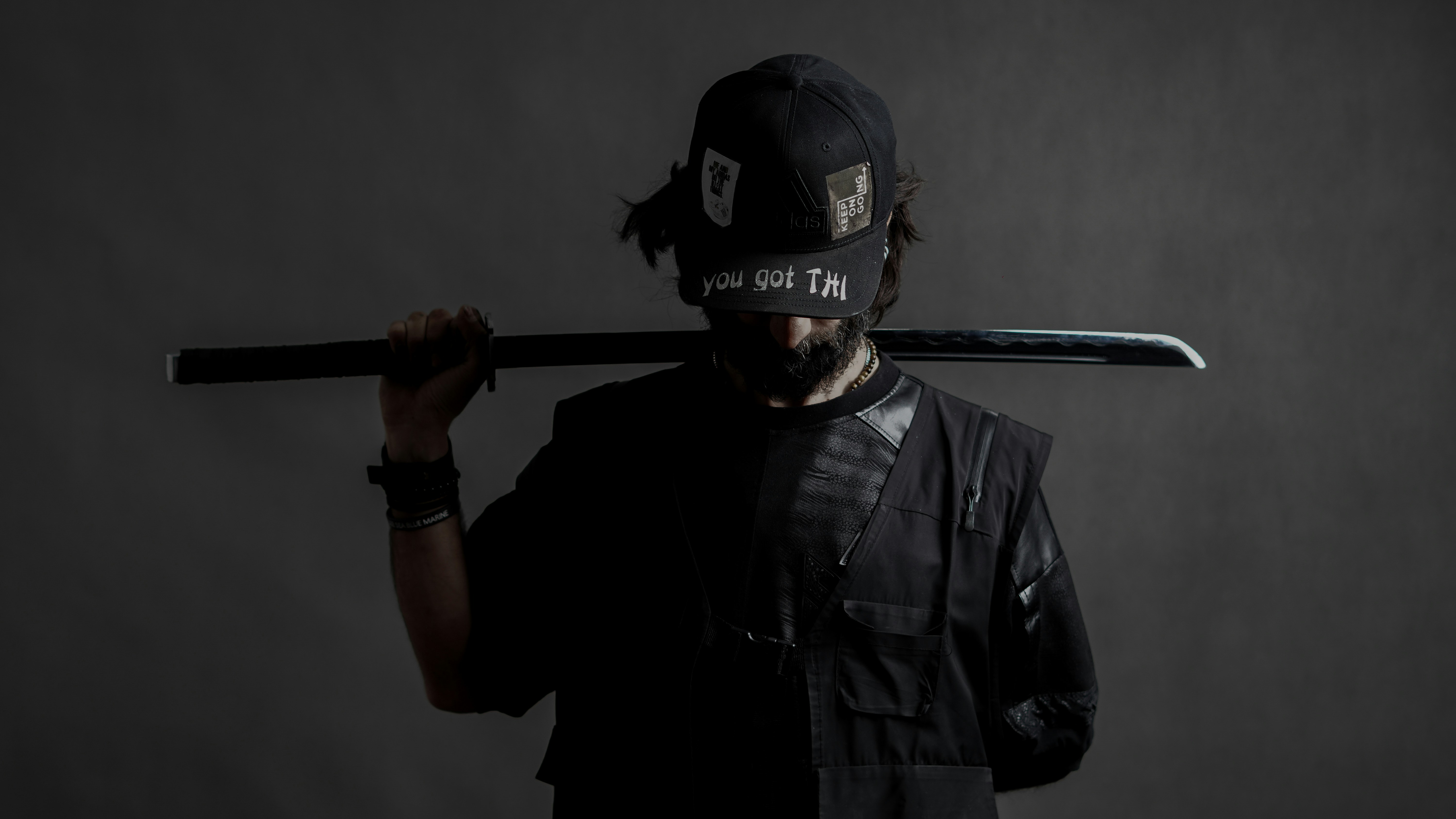 A person holds a sword over their shoulders. photo – Free Dark ...