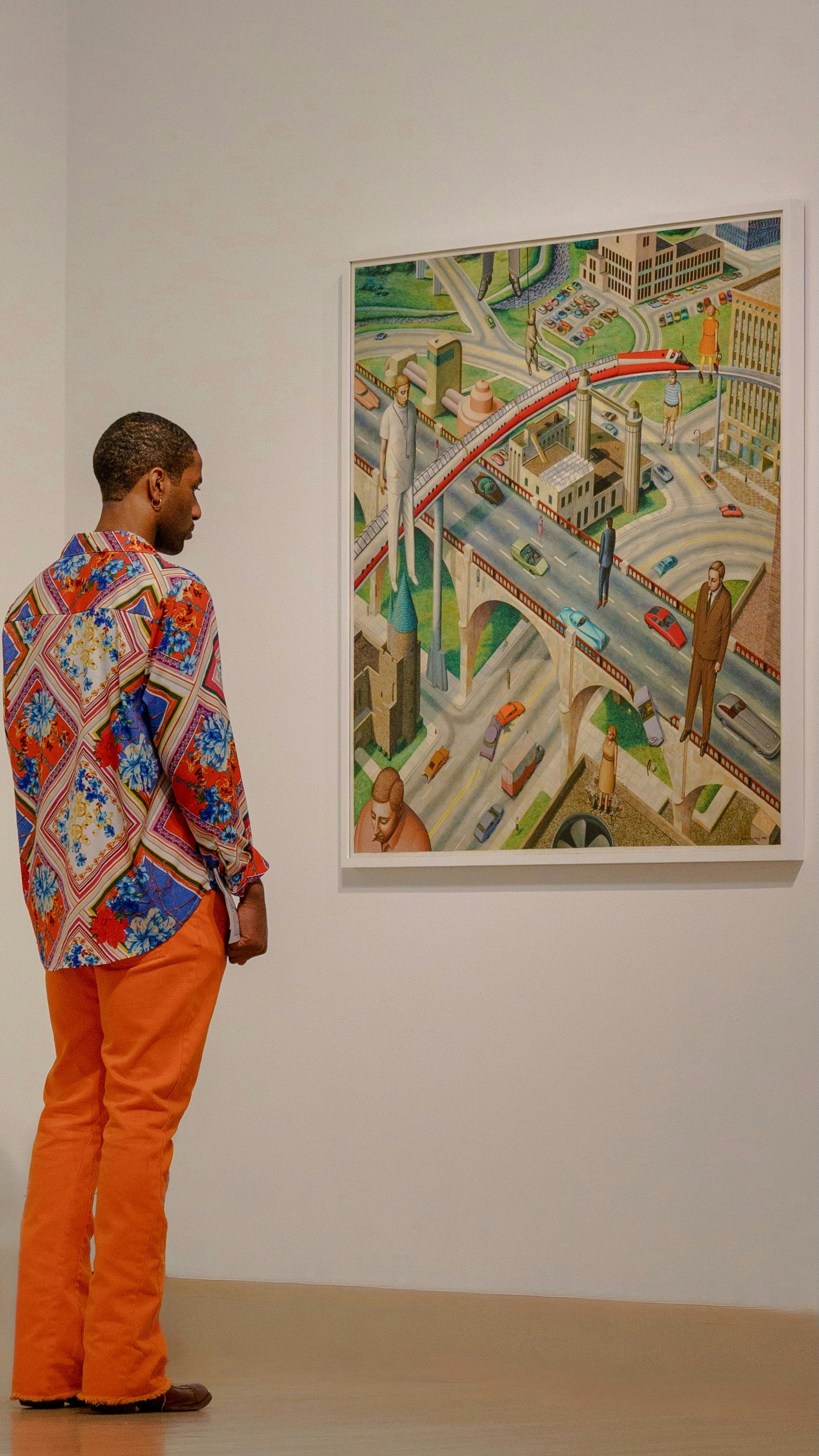 Vivid Pattern, Quiet Focus: A Visitor Contemplates a Cityscape Painting