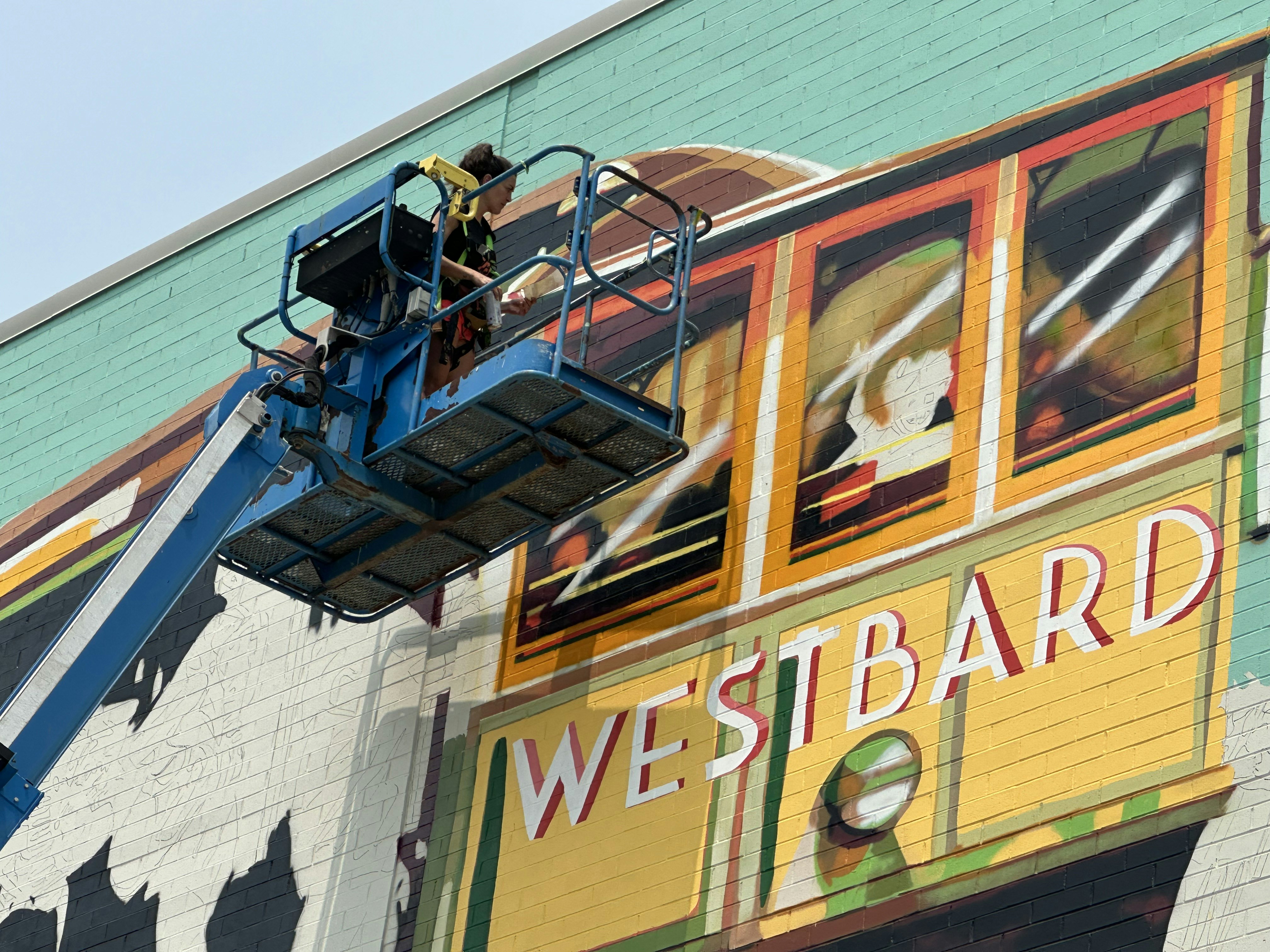 High-Altitude Mural in Progress: A Windowed Wall Comes to Life