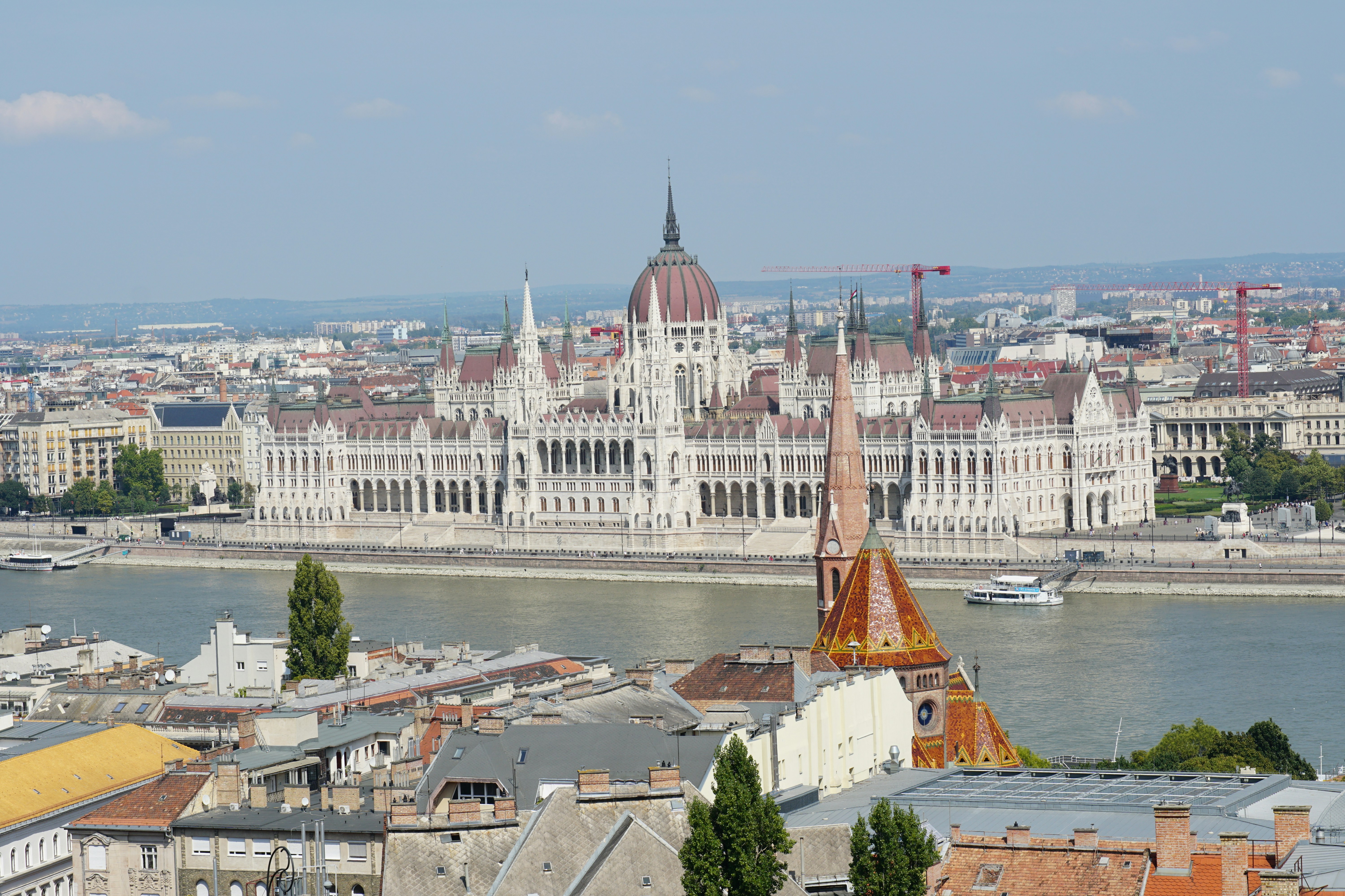 The hungarian parliament building overlooks the danube.