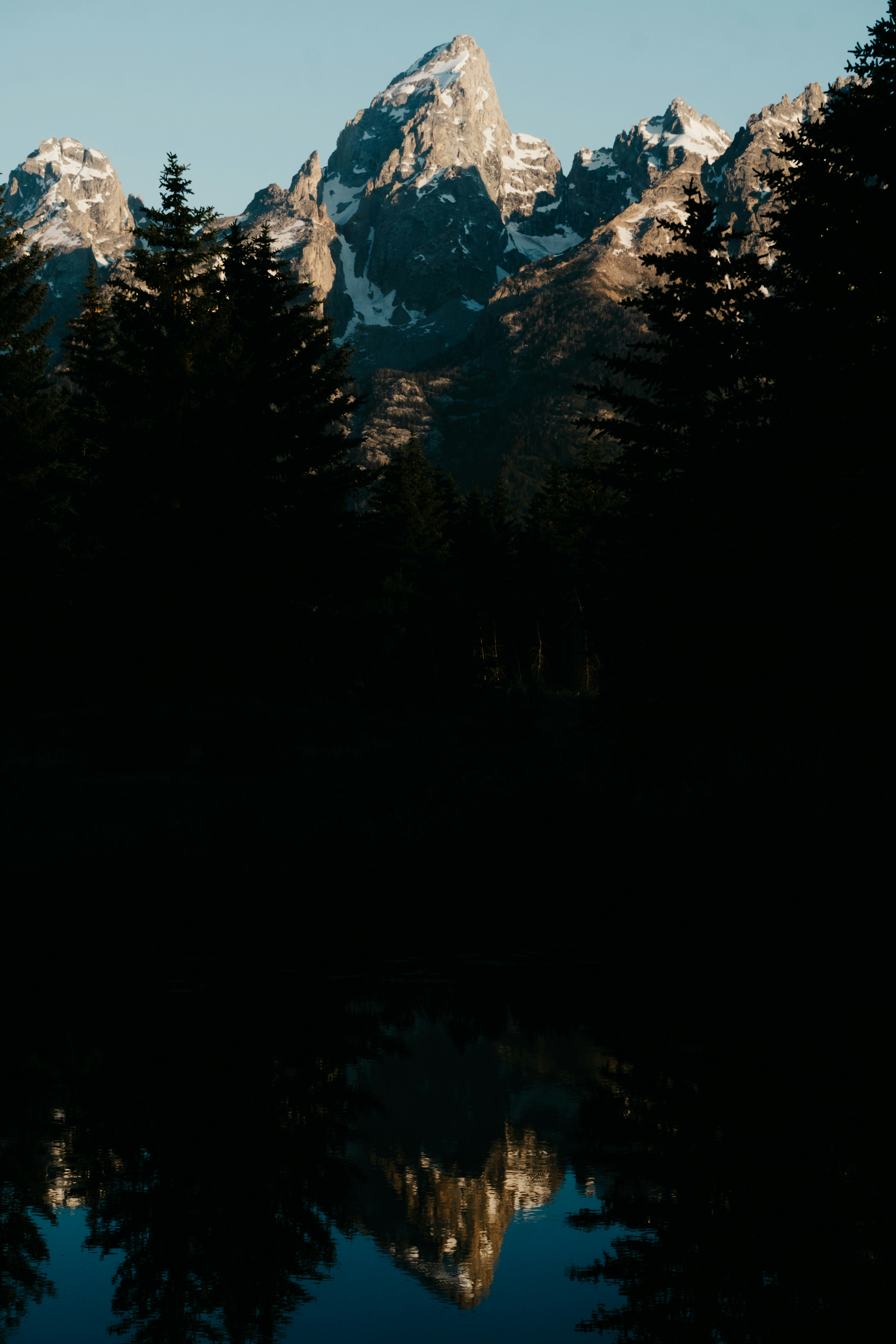 Majestic Peaks Reflecting in Tranquil Waters