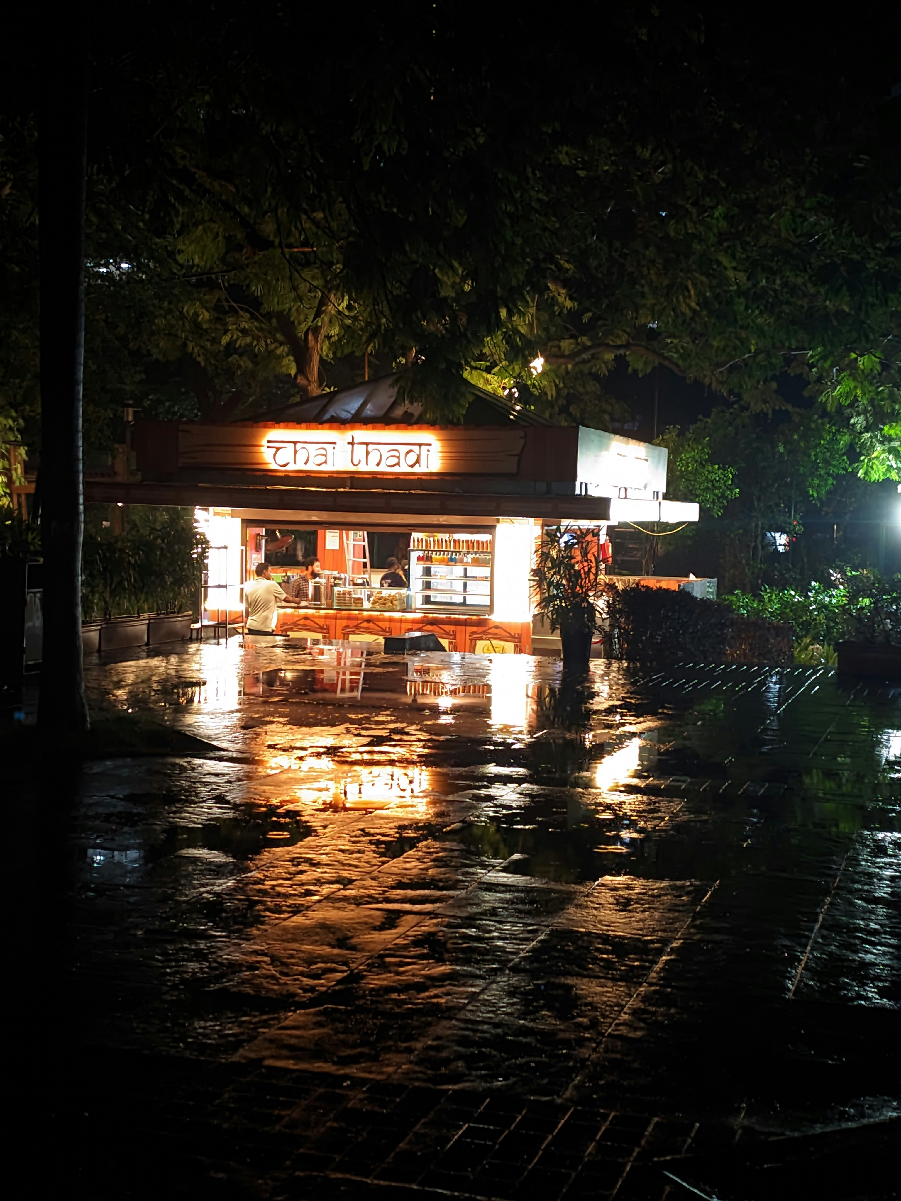 Neon Snack Kiosk After Dark: Rain-Kissed Street Reflections
