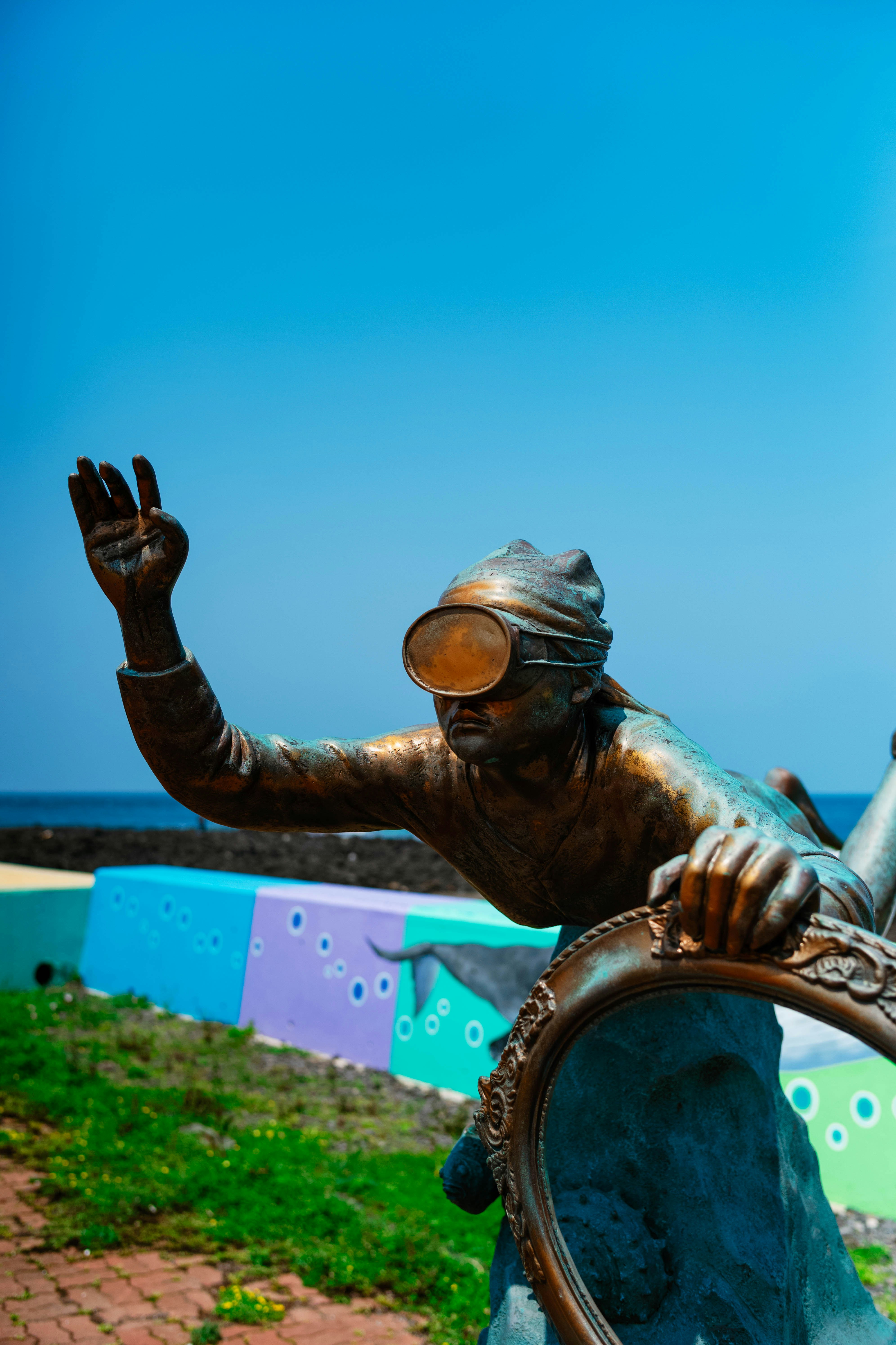 Bronze Diver: A Sea-Crested Gesture by the Pier