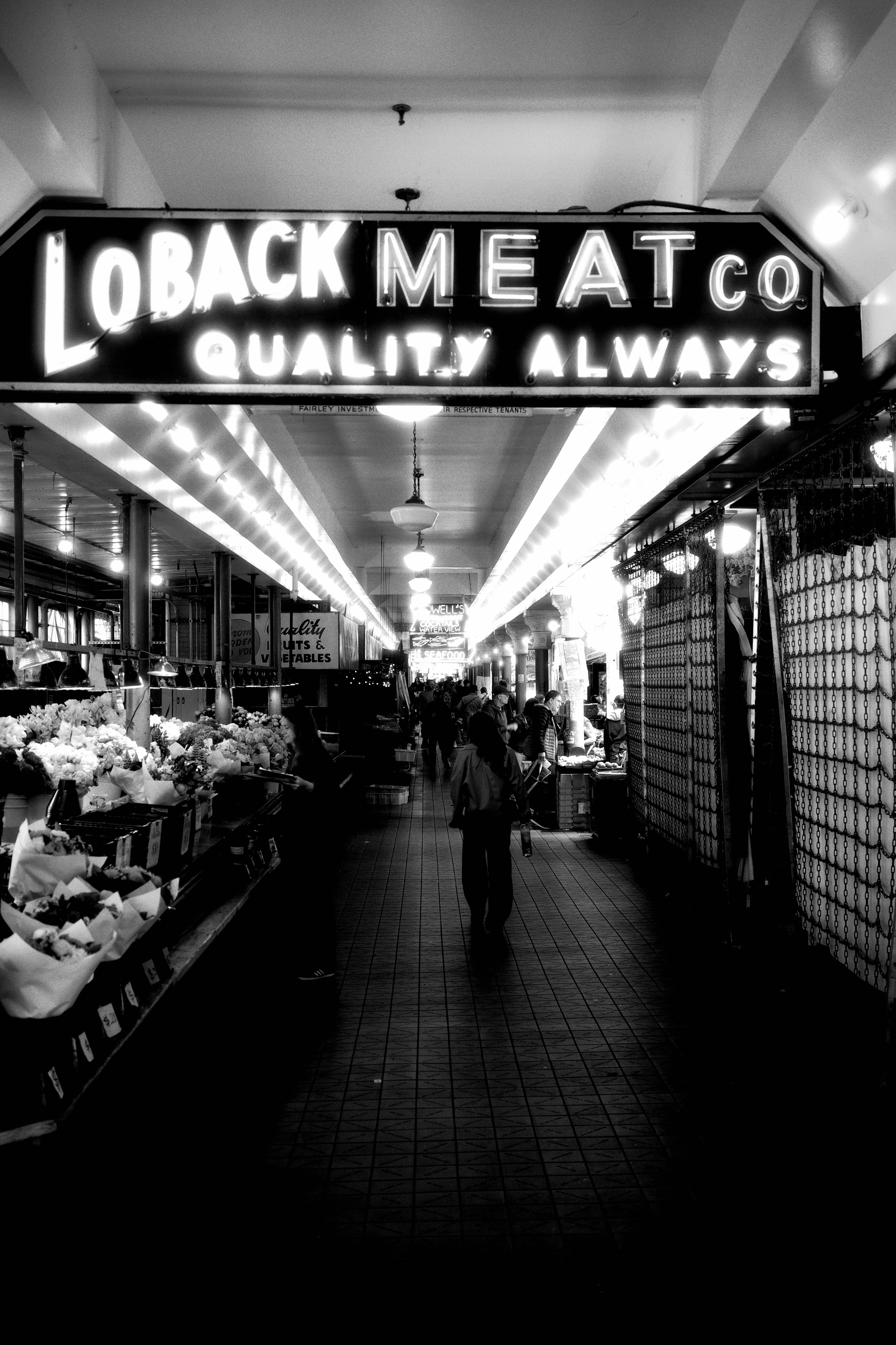 Neon Ledger: A Silent Walk Through the Market Corridor