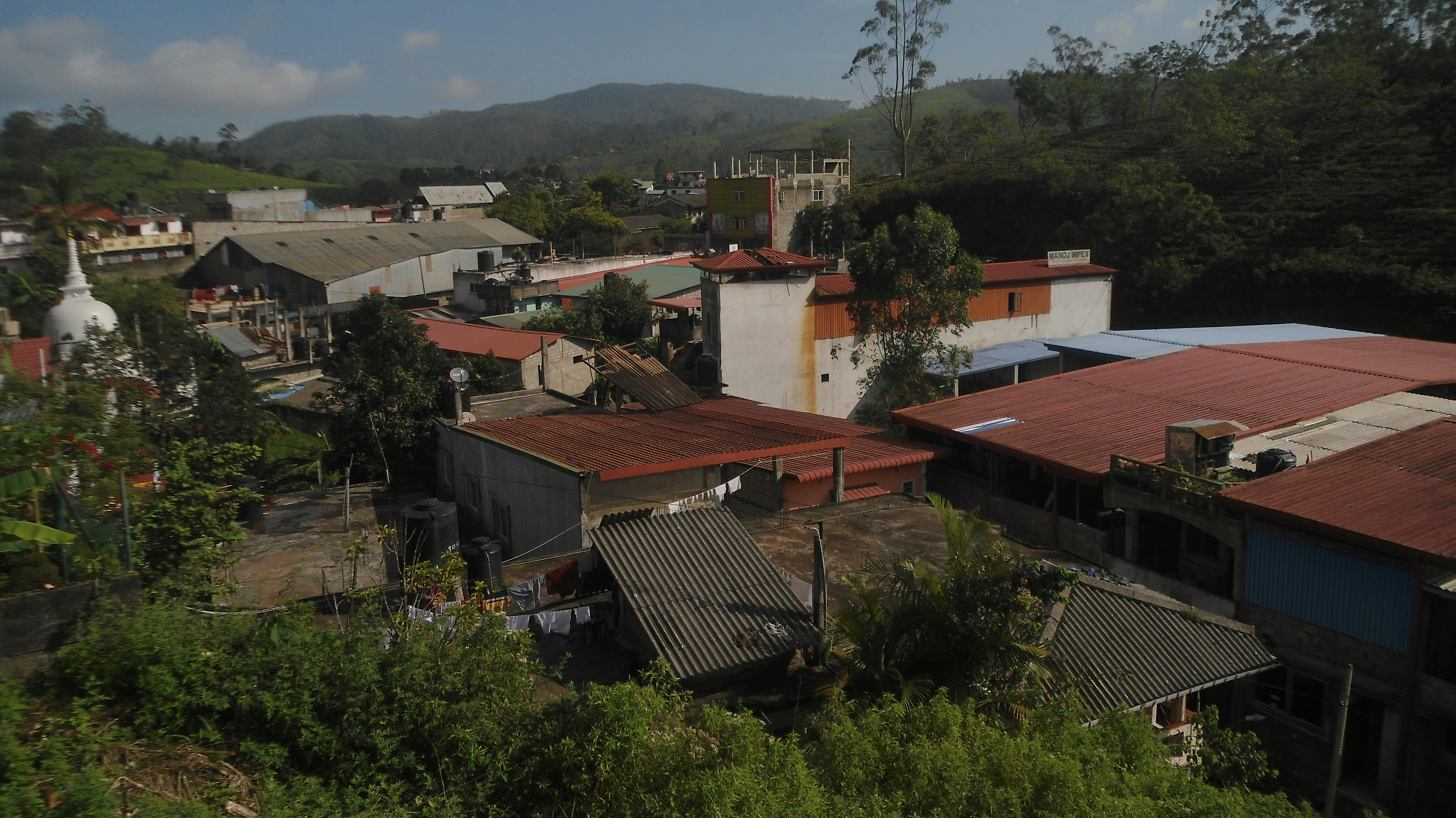 A village nestled in lush greenery.