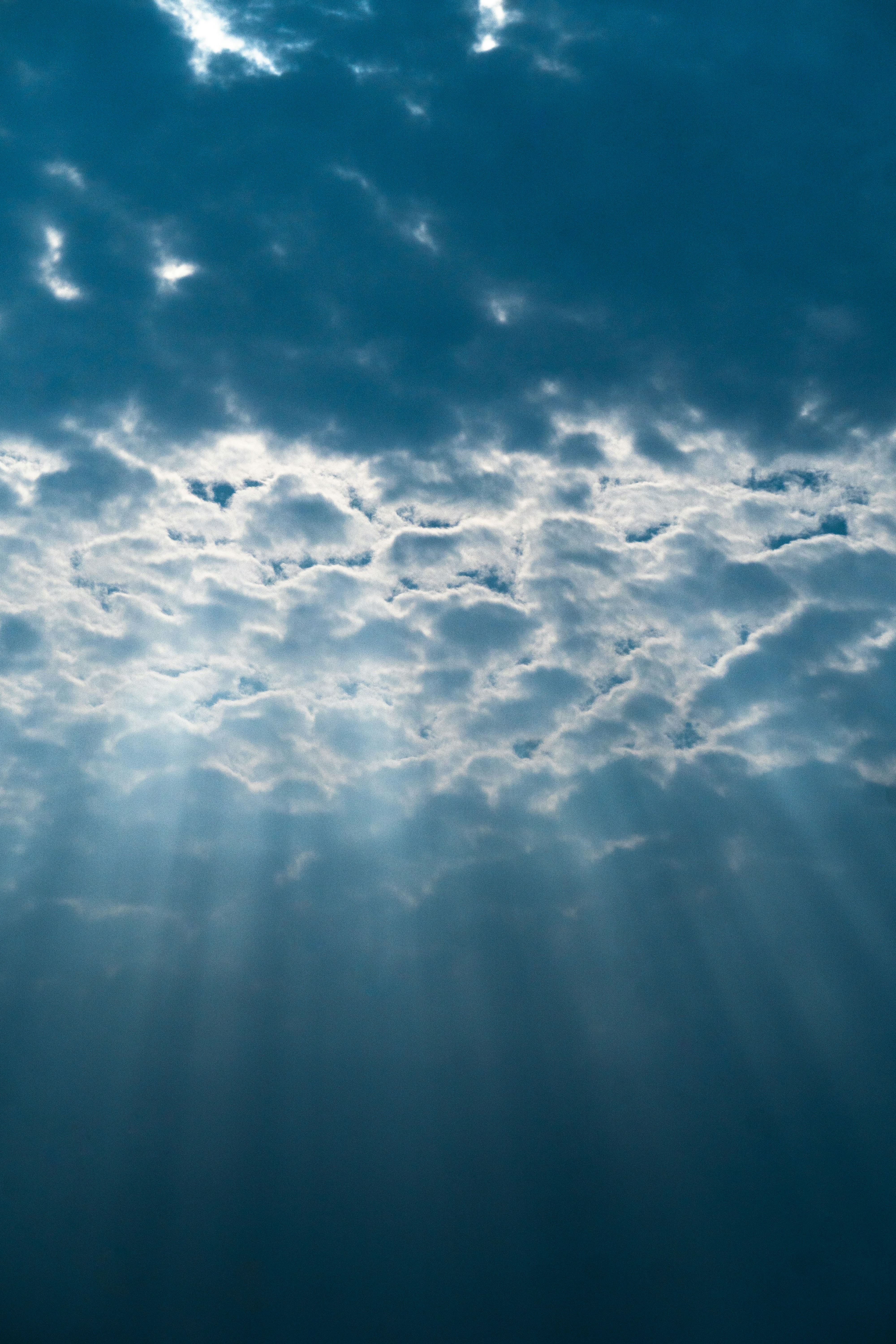 Rays Through Cloudbreak: A Serene Sky Opening