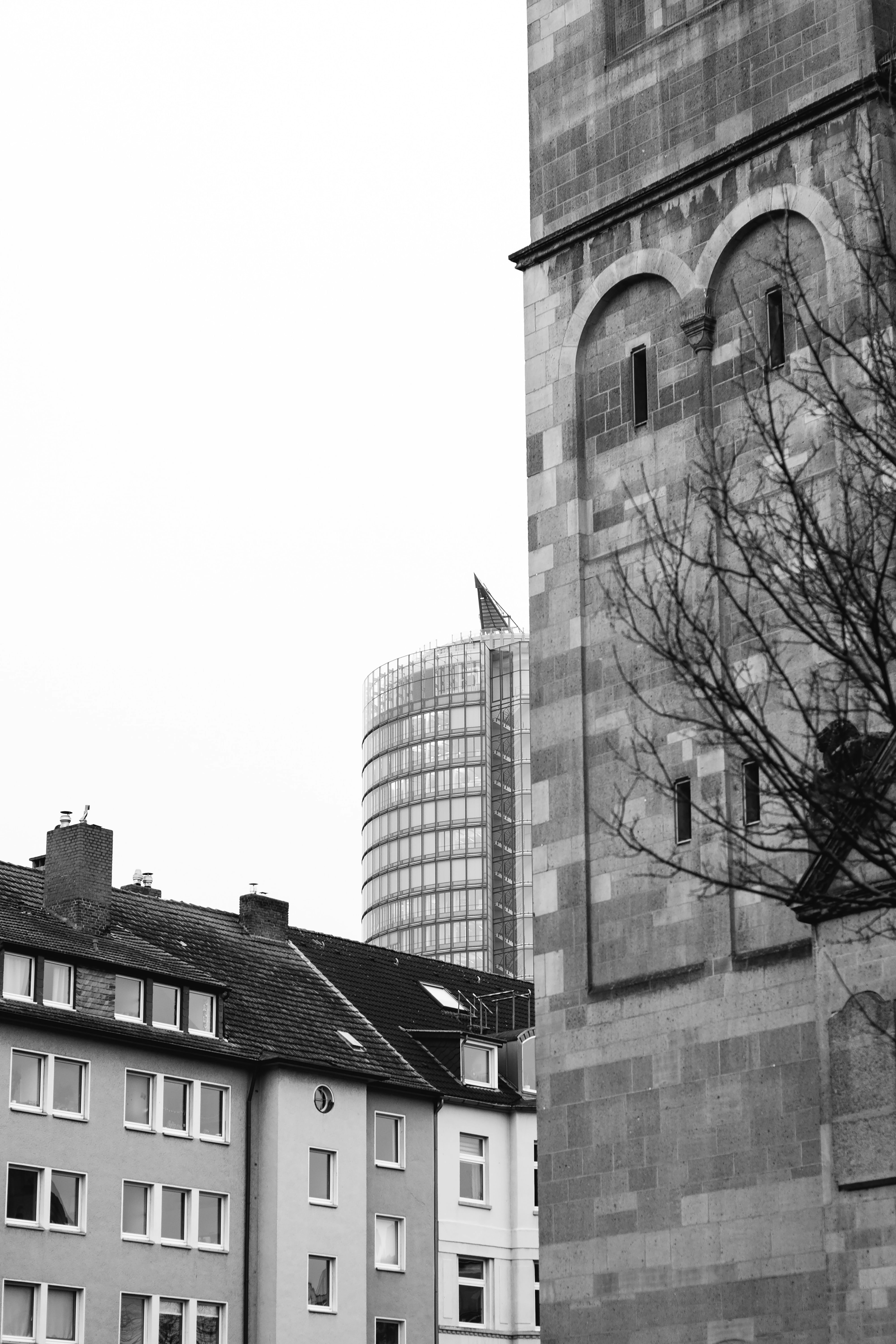 Buildings of varied architecture contrast each other. photo – Free City ...