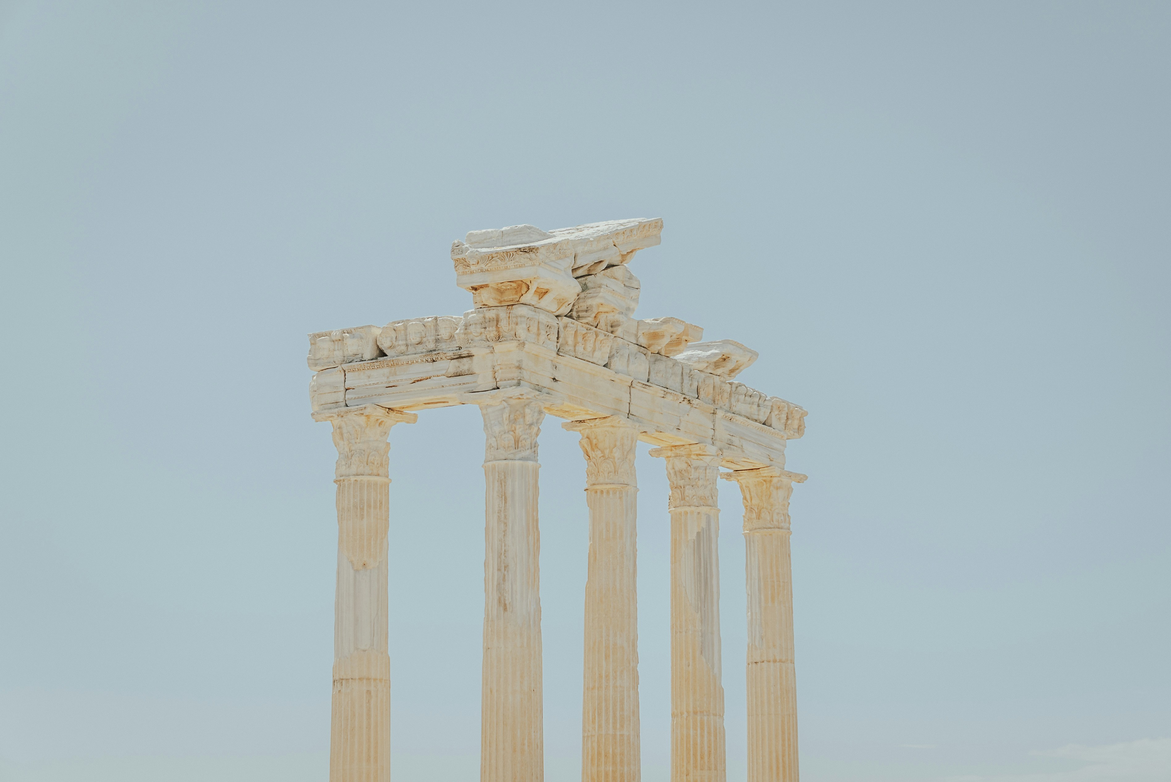Doric Echoes Above a Quiet Blue Sky