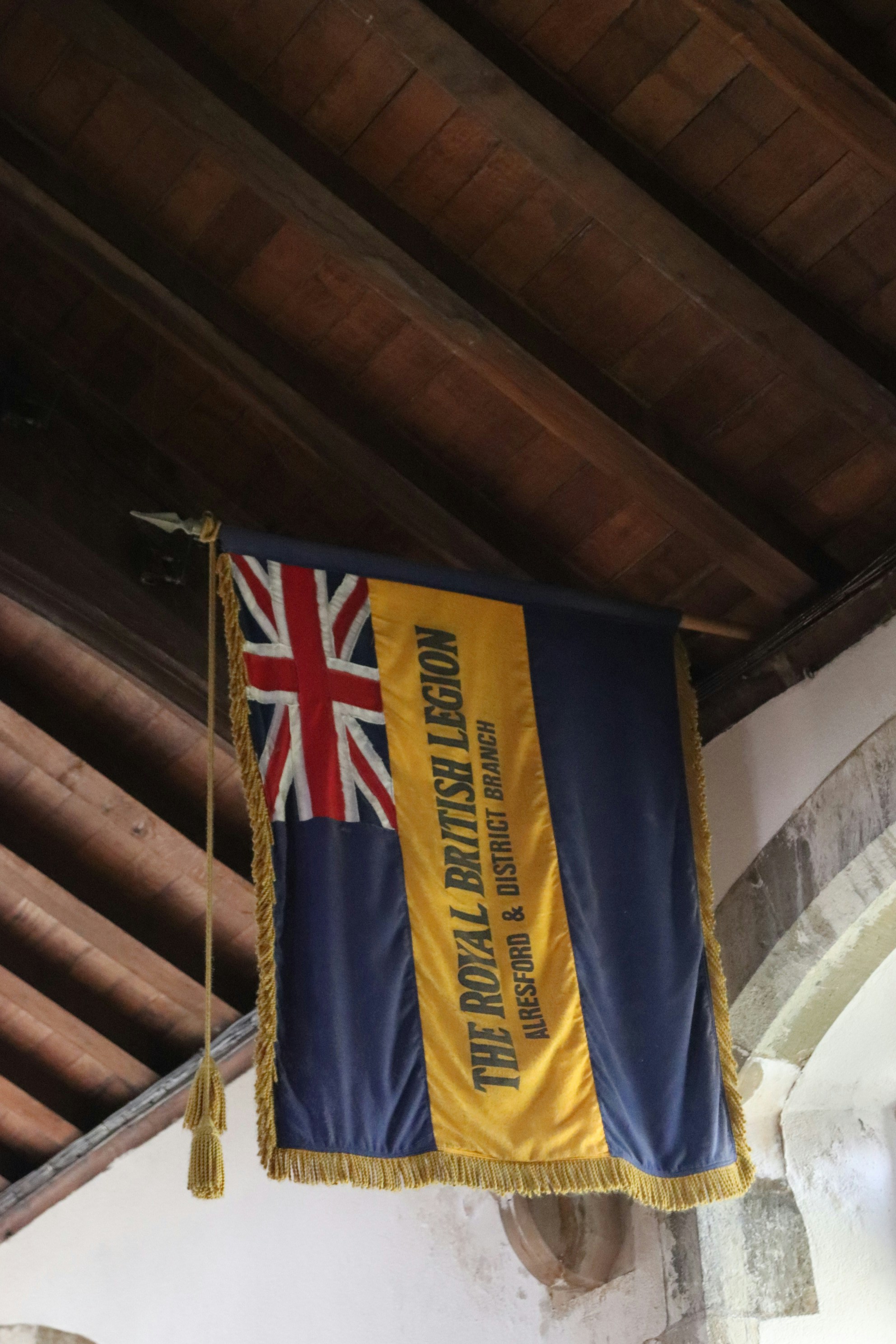 A royal british legion flag hangs indoors. photo – Free Flag Image on ...