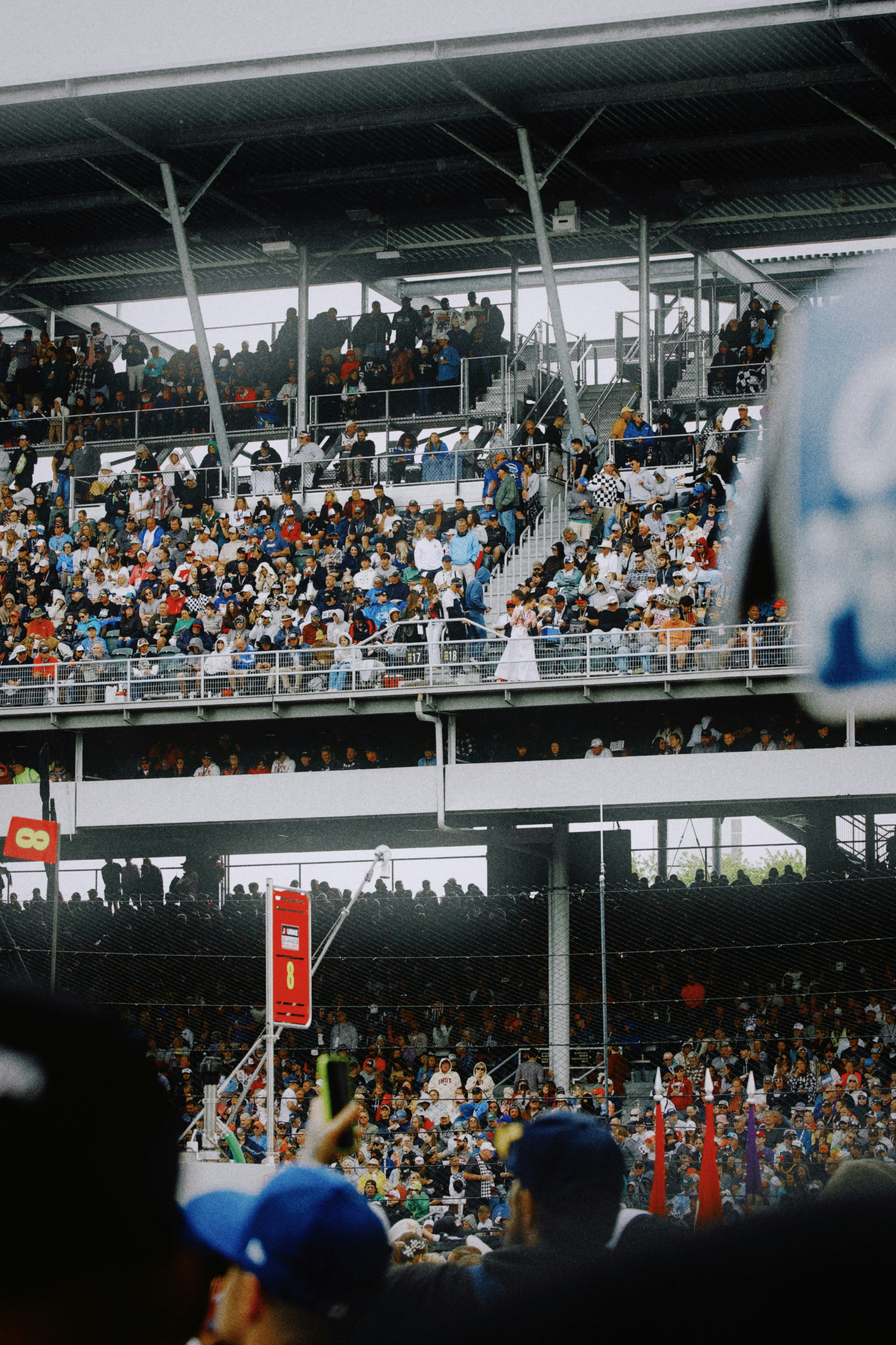 A crowded stadium is packed with spectators. photo – Free Man Image on ...