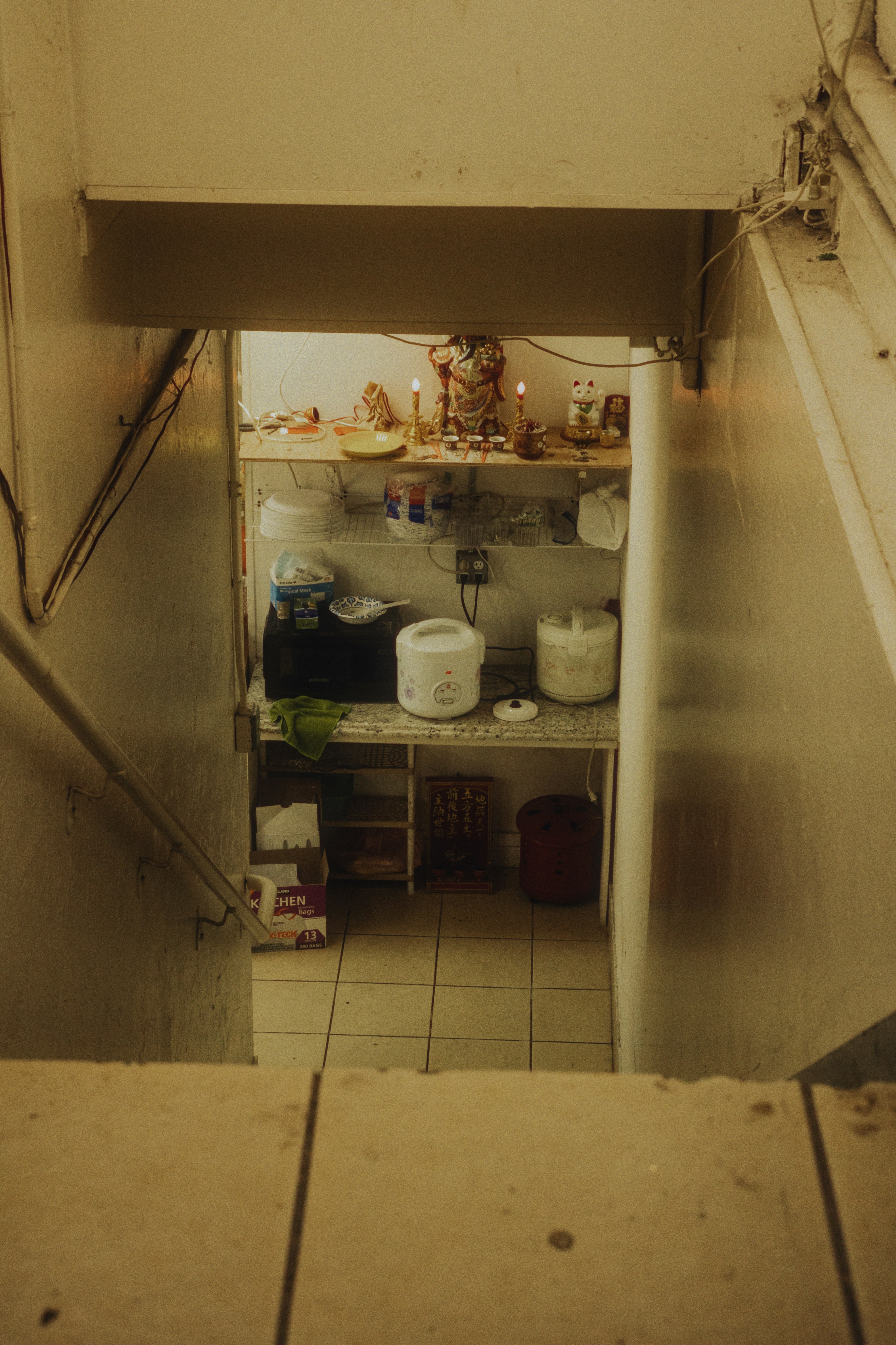 Looking down into a small, homey kitchen space.
