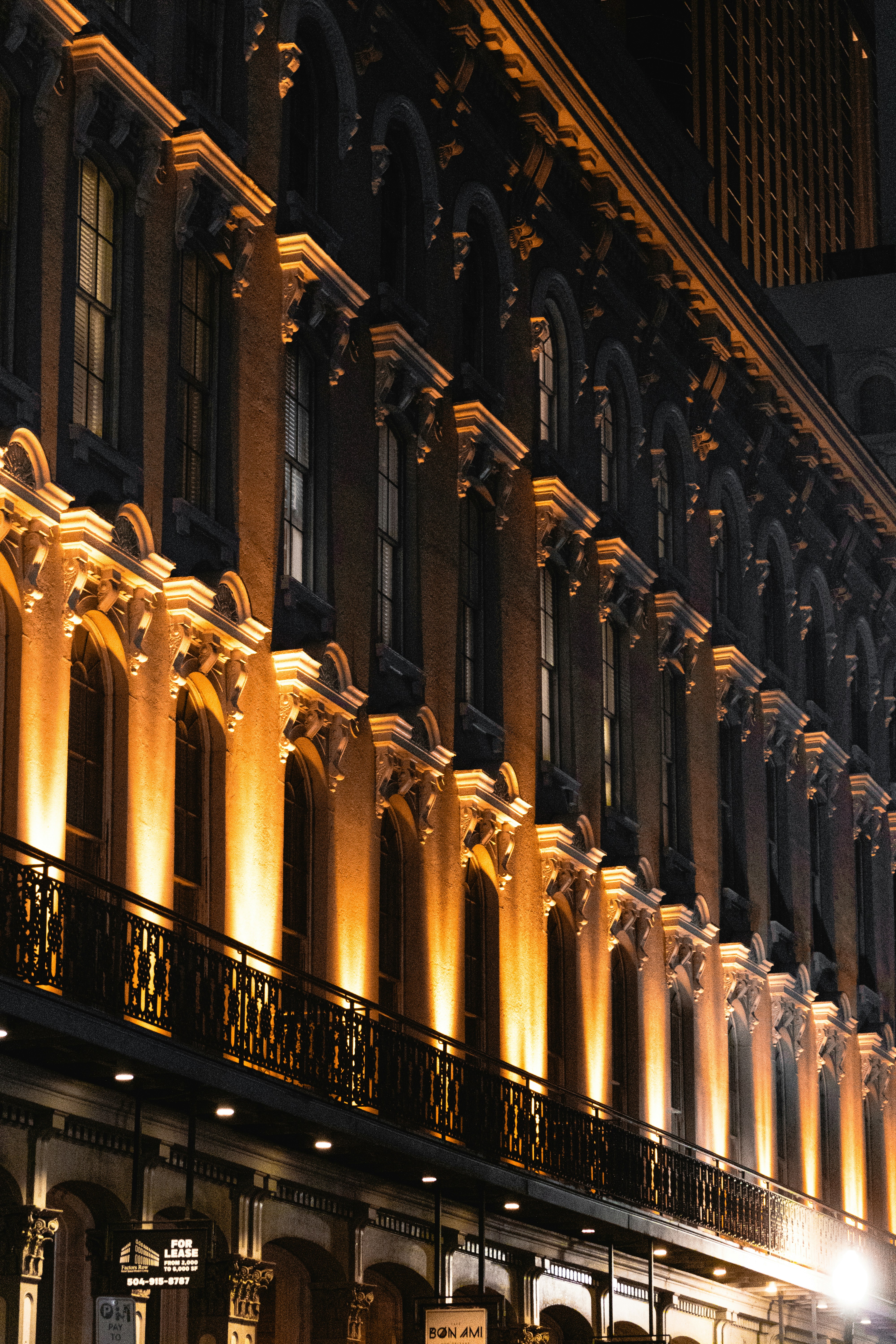 a golden-lit building on Perdido Street, New Orleans, LA, USA