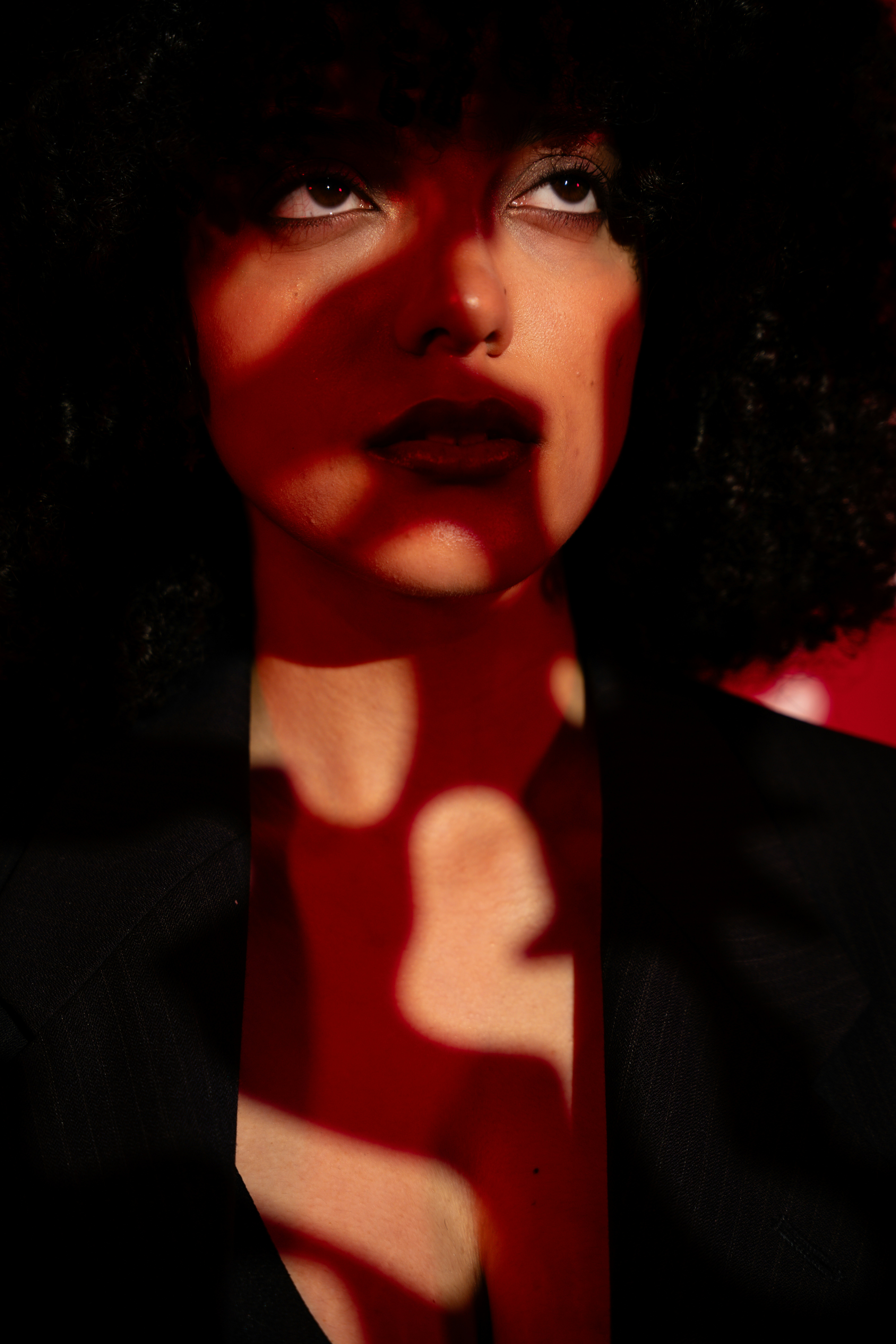 Woman's face with artistic red light projection. photo – Free Portrait ...