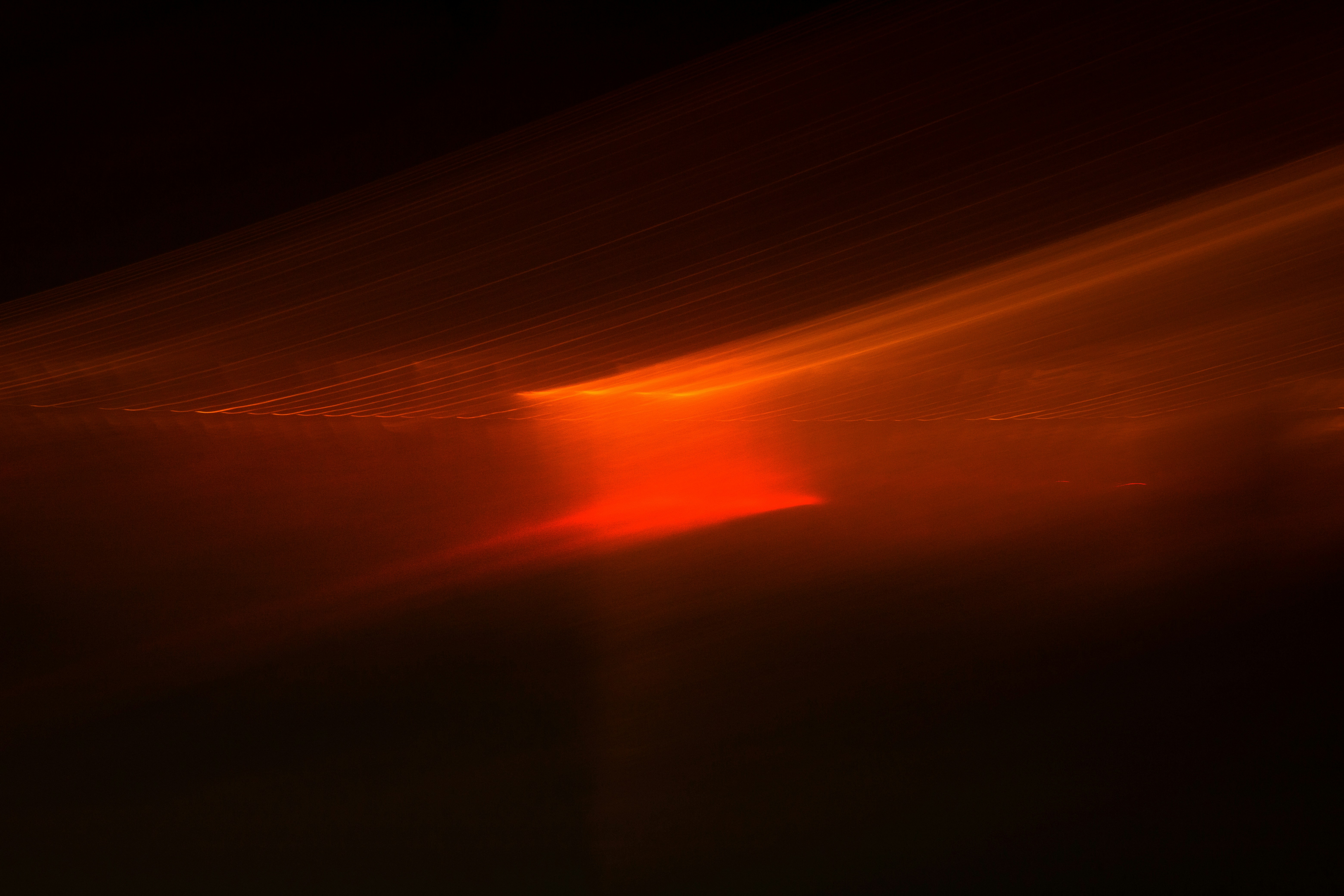 Abstract light streaks in a dark space.