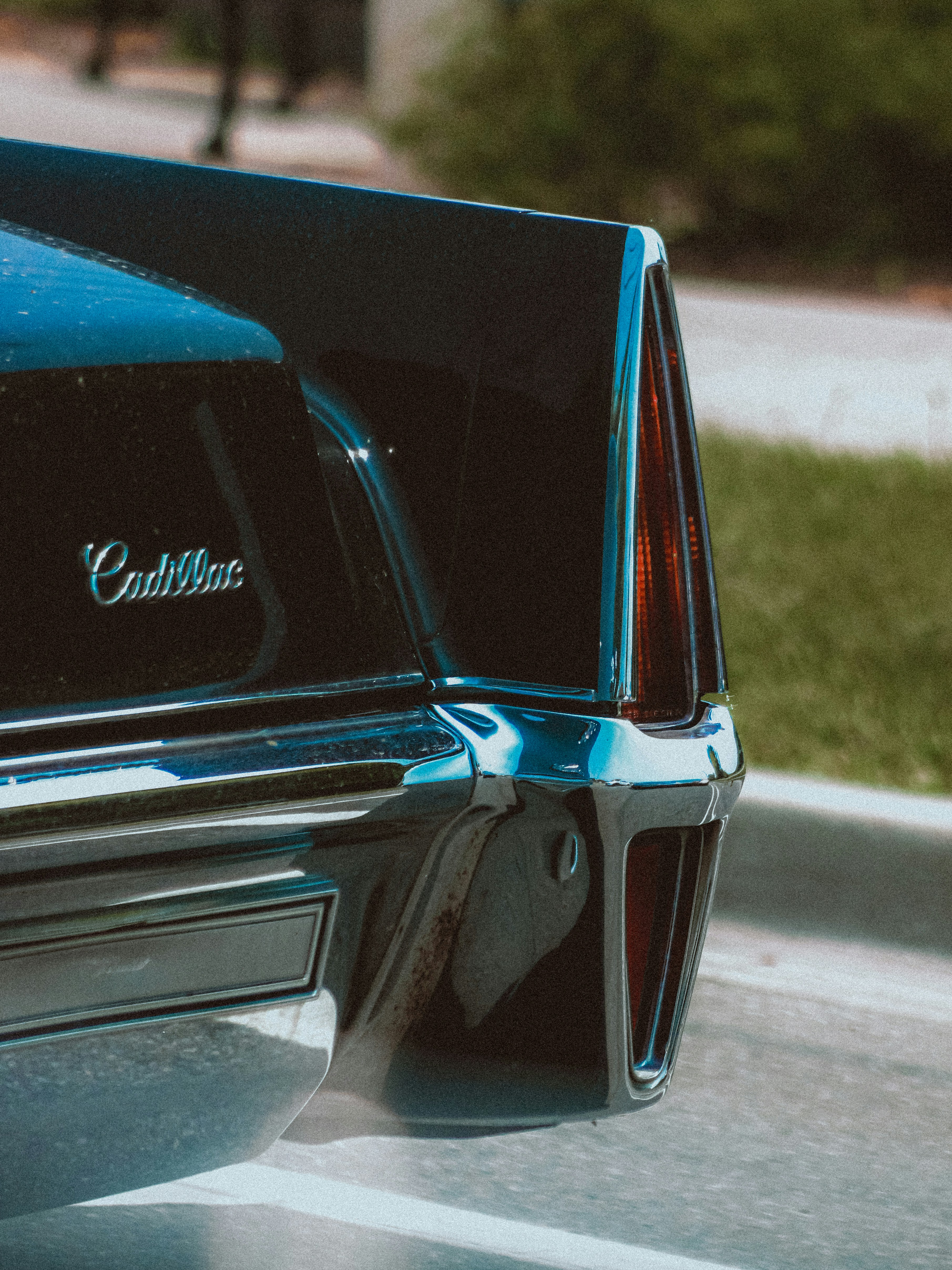 Blue Beauty: Tailfin and Emblem of a Classic Cadillac