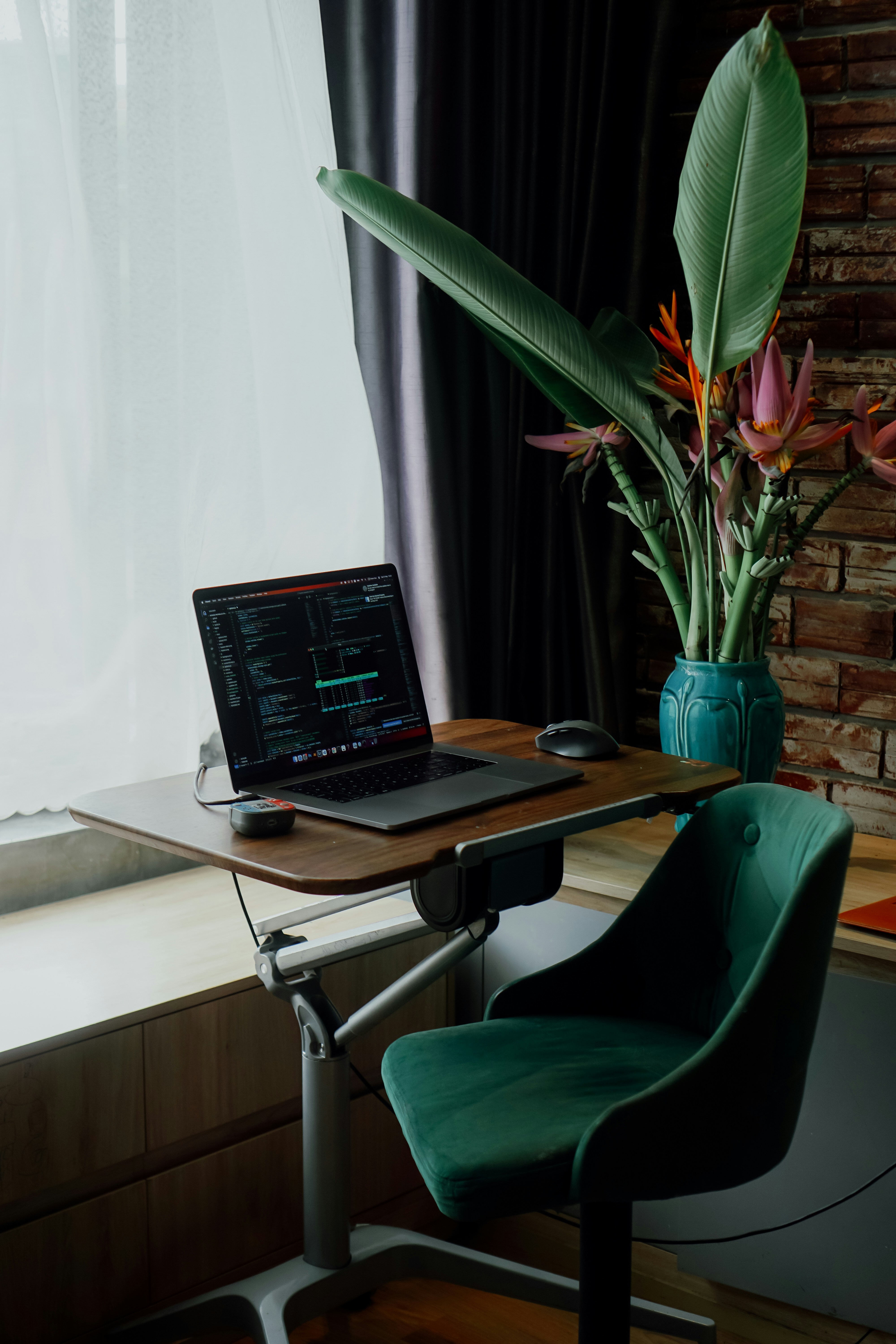 Laptop and flowers sit in a stylish home office. photo – Free Computer ...