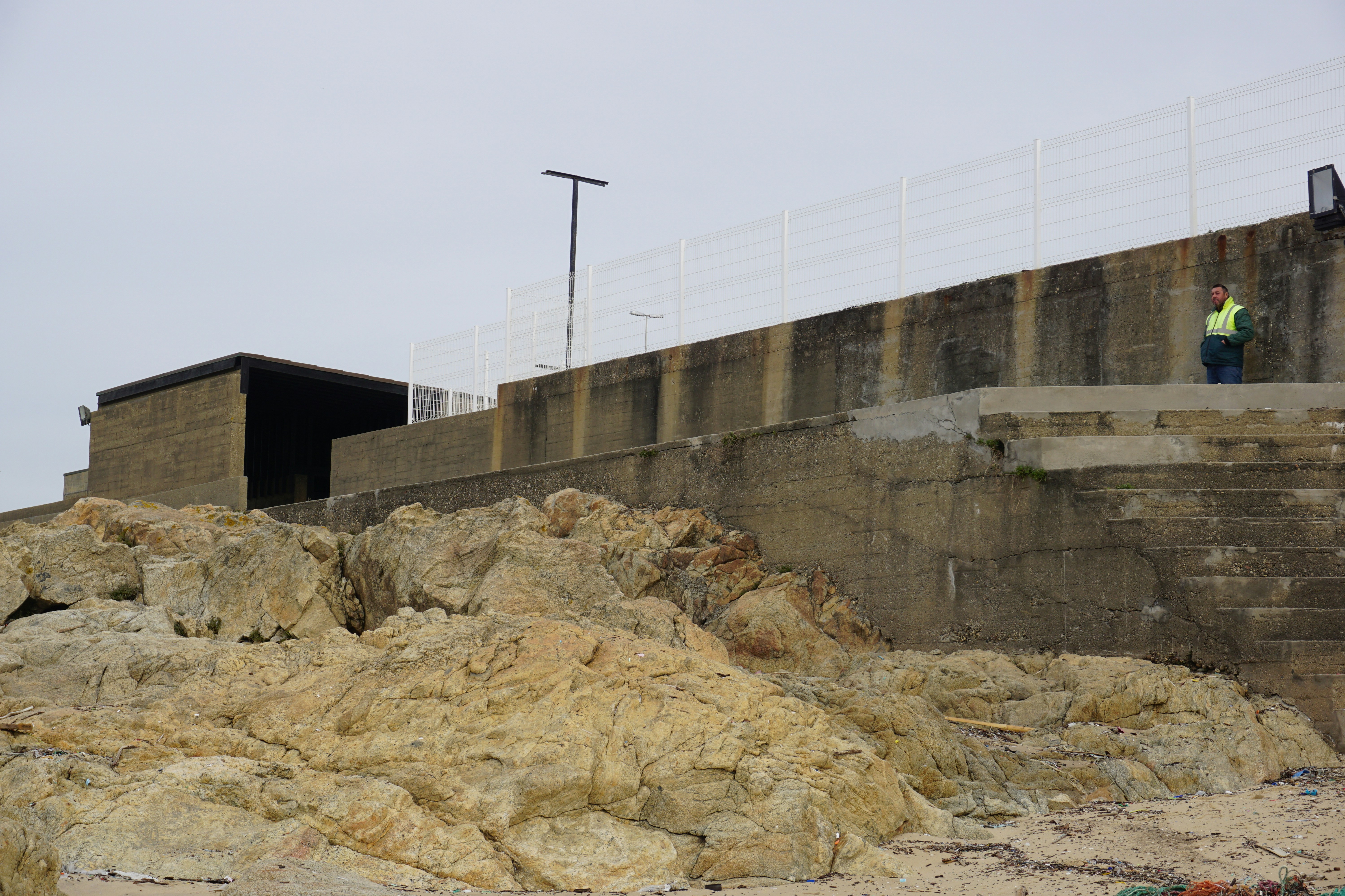 Lone Keeper Overlooking Tidal Concrete