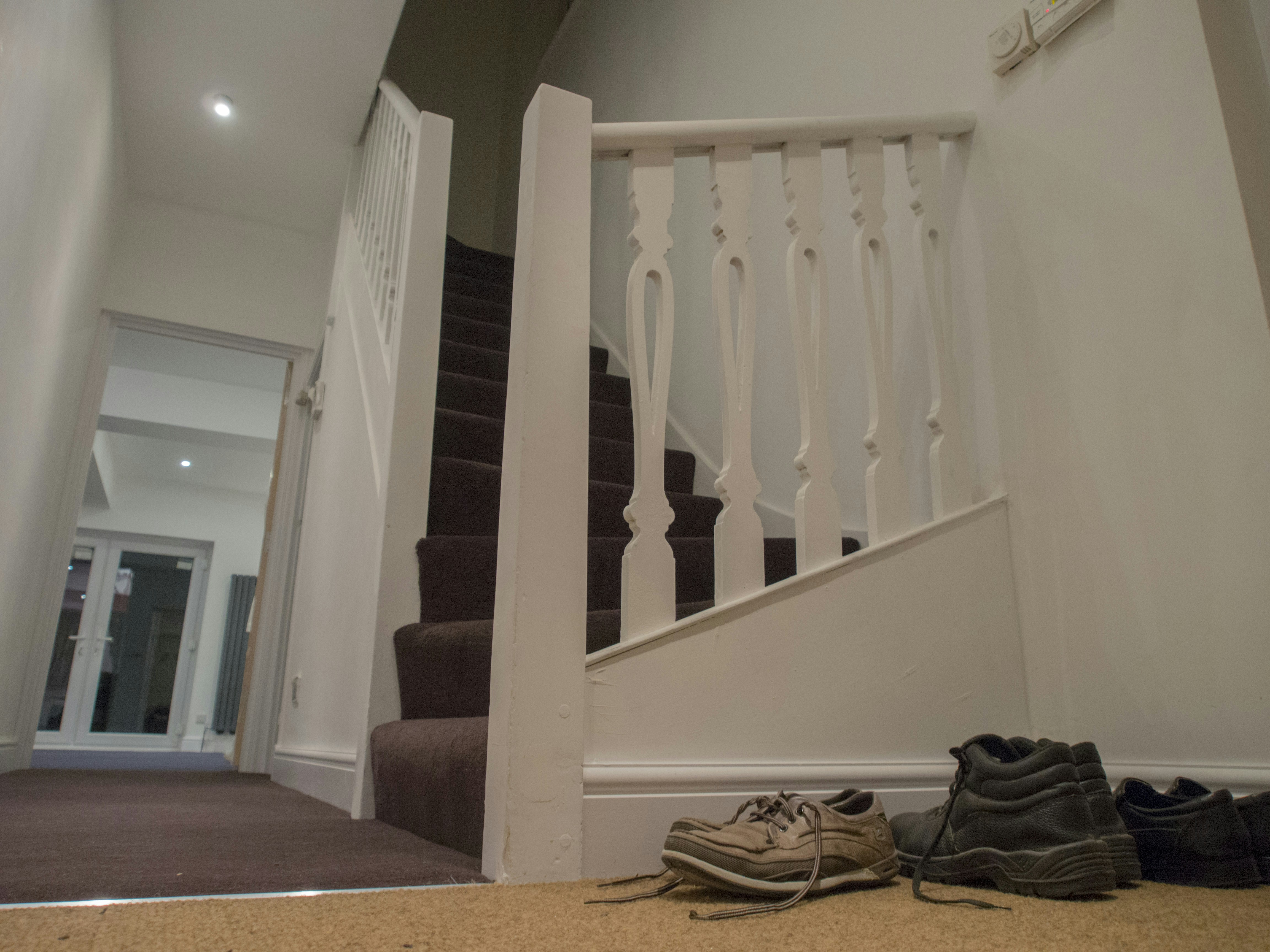 Sole Gallery at the Staircase: Quiet Entryway of a Modern Home