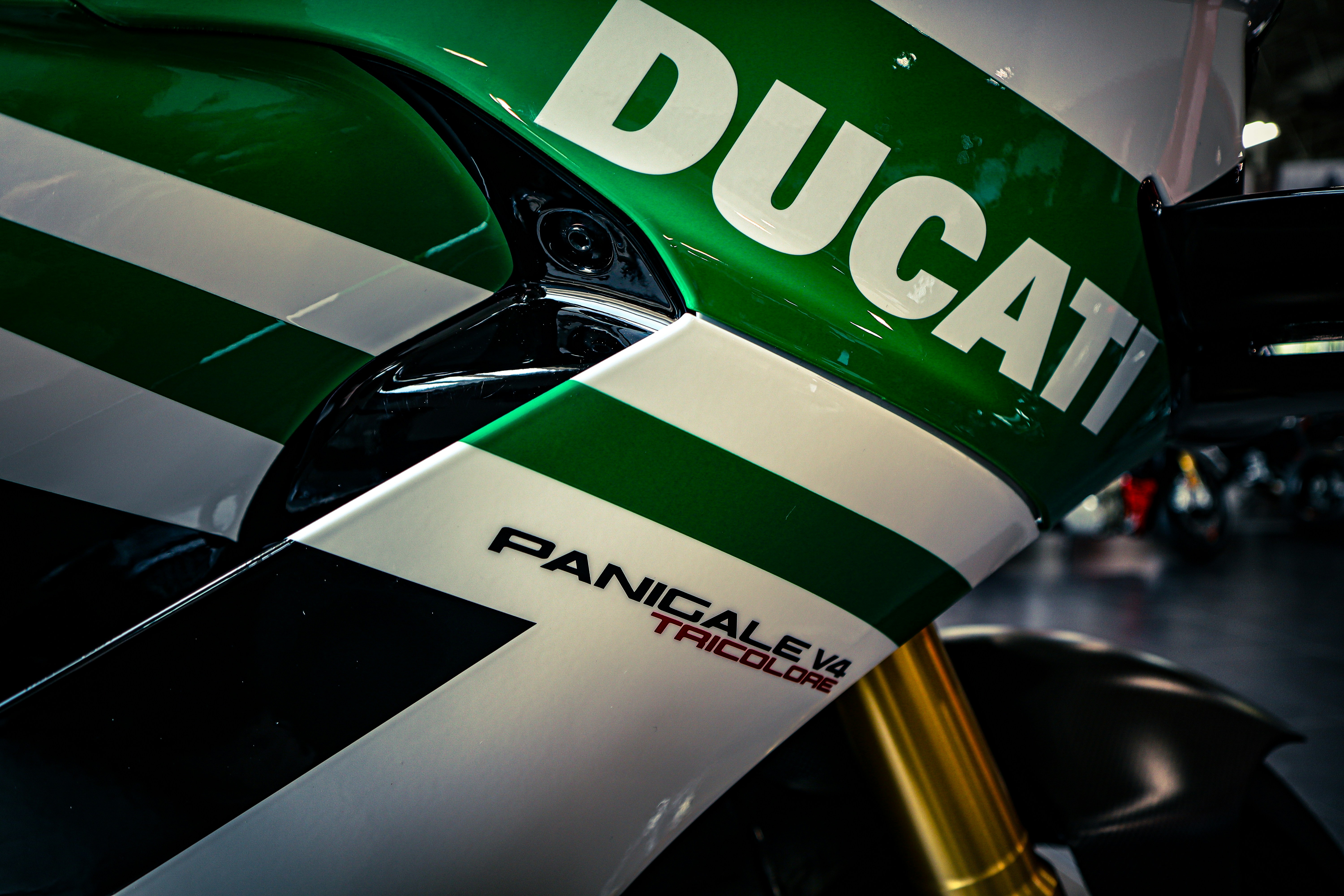 A ducati panigale motorcycle is on display. photo – Free Car Image on ...