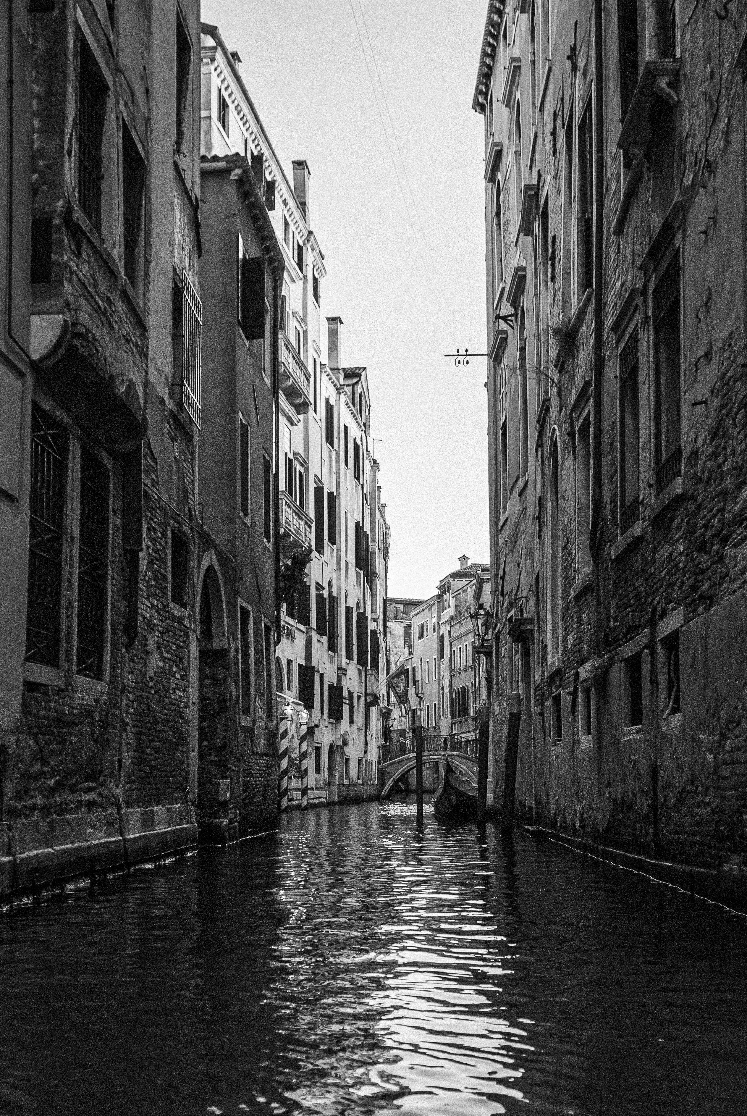 A venetian canal with buildings on either side.