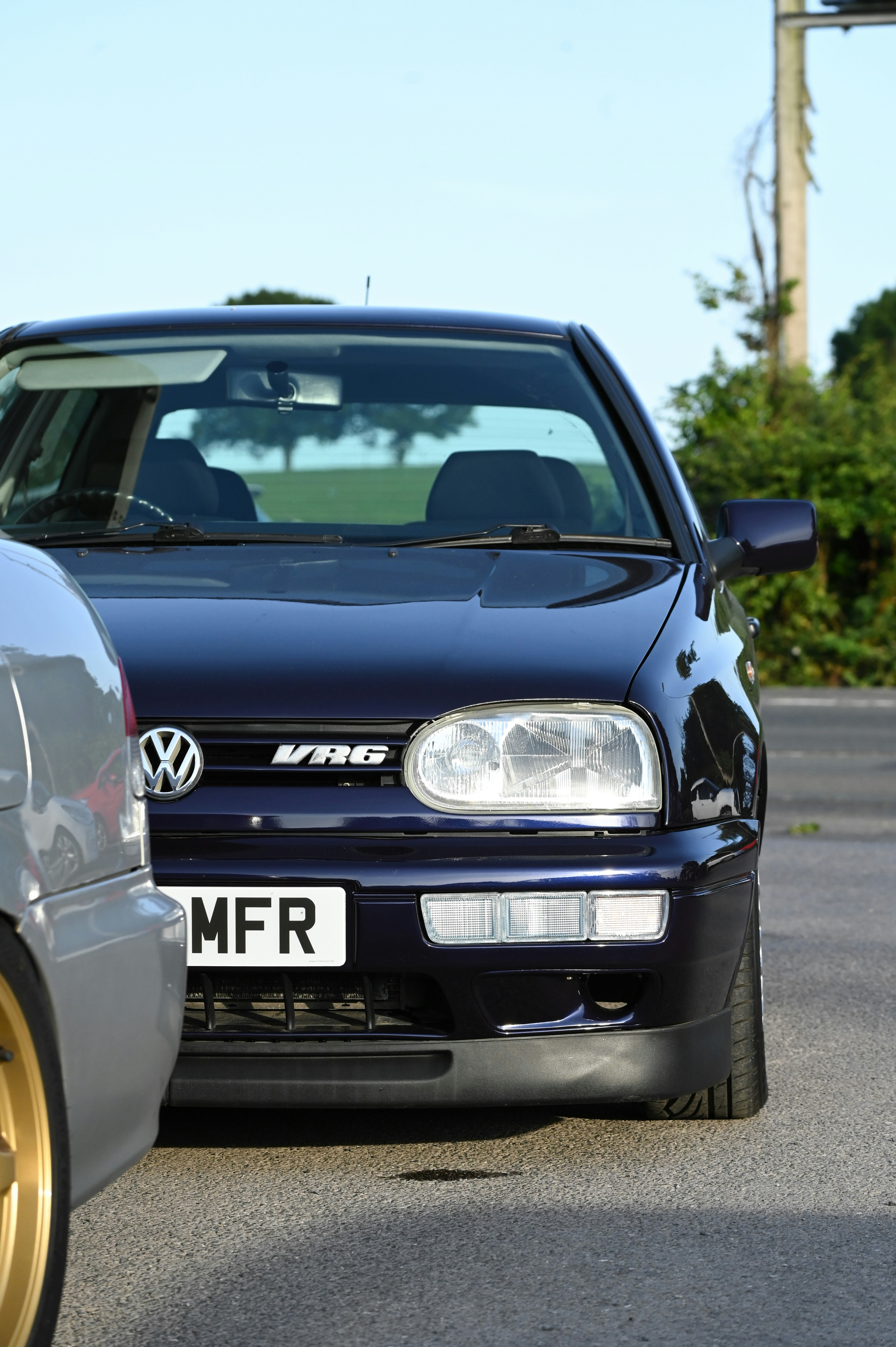 A dark blue volkswagen golf mk3 is pictured. photo – Free Old car Image ...