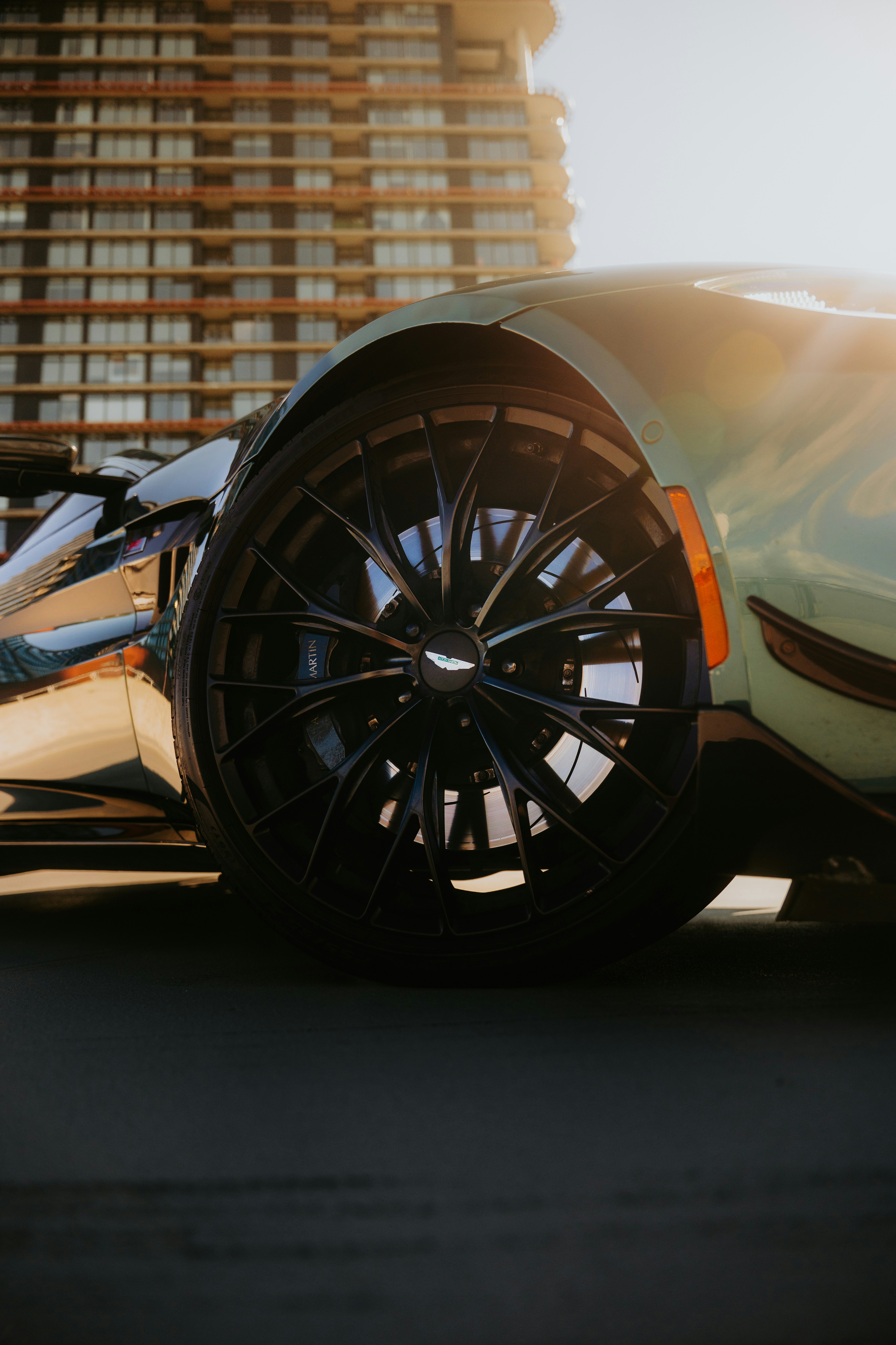 An aston martin wheel showcases sleek design. photo – Free Image on ...