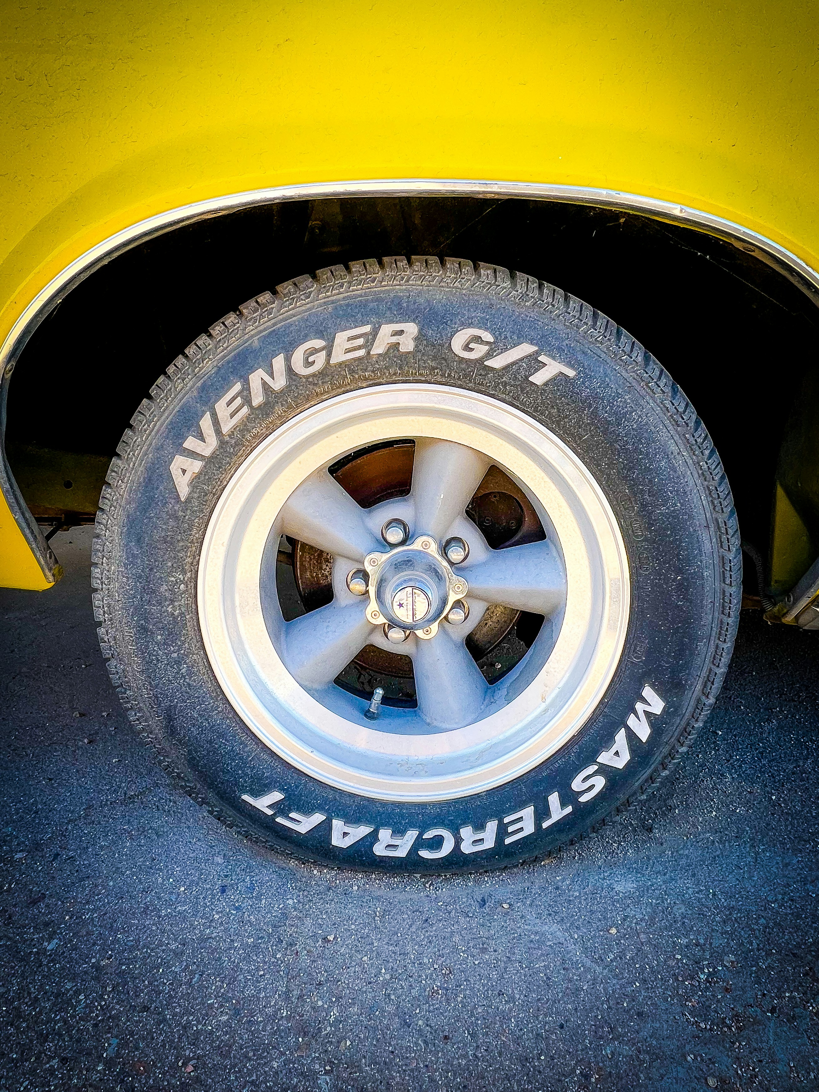 Sunlit Yellow Wheel: A Classic Rim Reveals Mastercraft Avenger G/T Detail