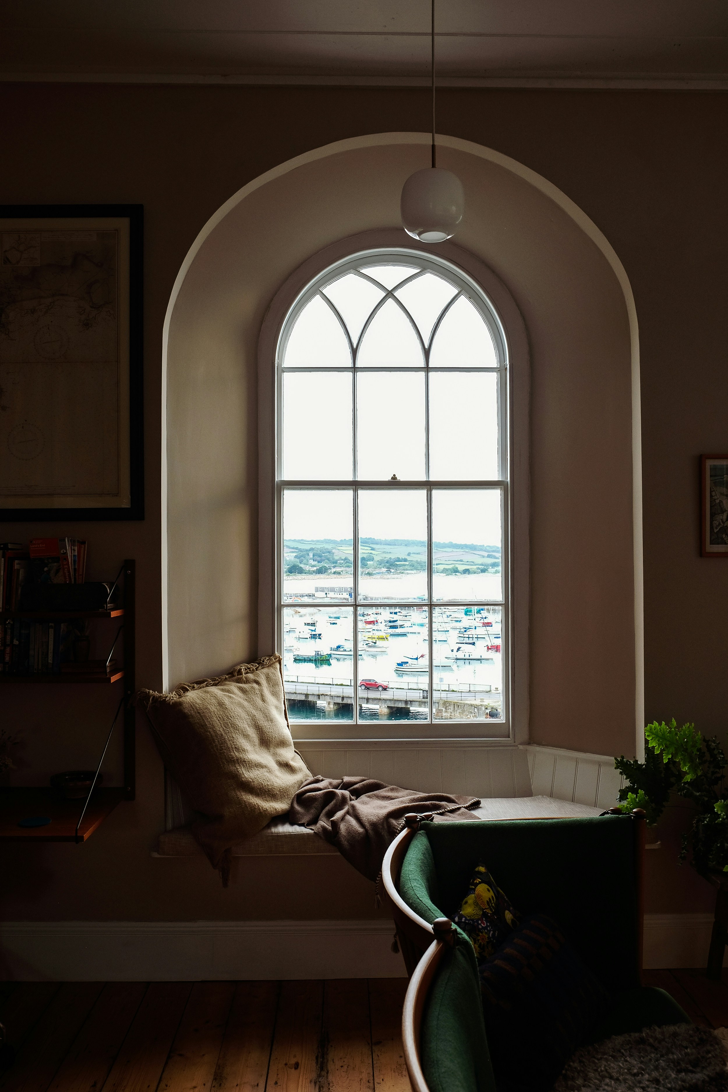 Arched Window to the Harbor: A Quiet Nook Framing Boats
