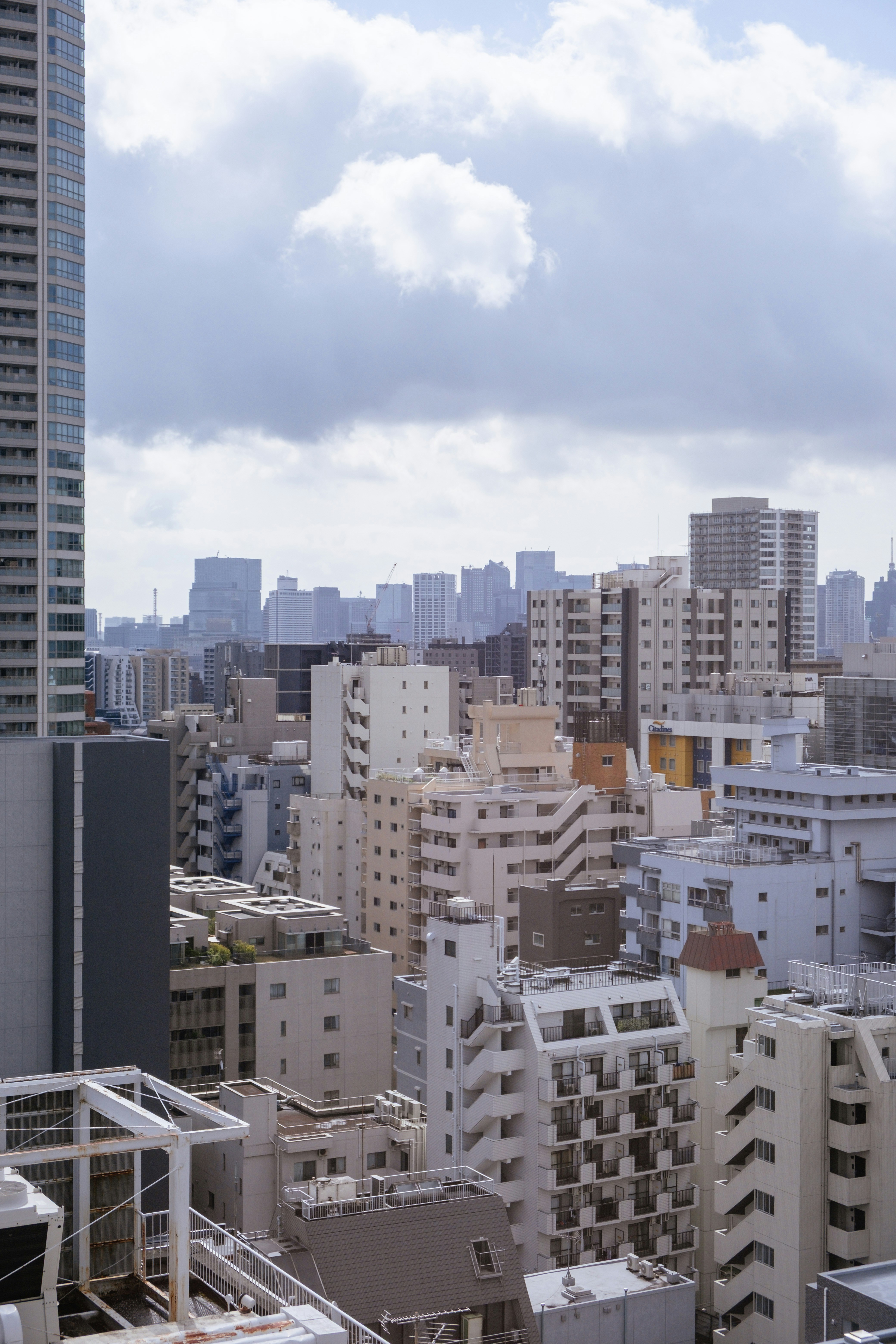 Concrete Compass: A Dense Cityscape Reaching for the Cloudscape