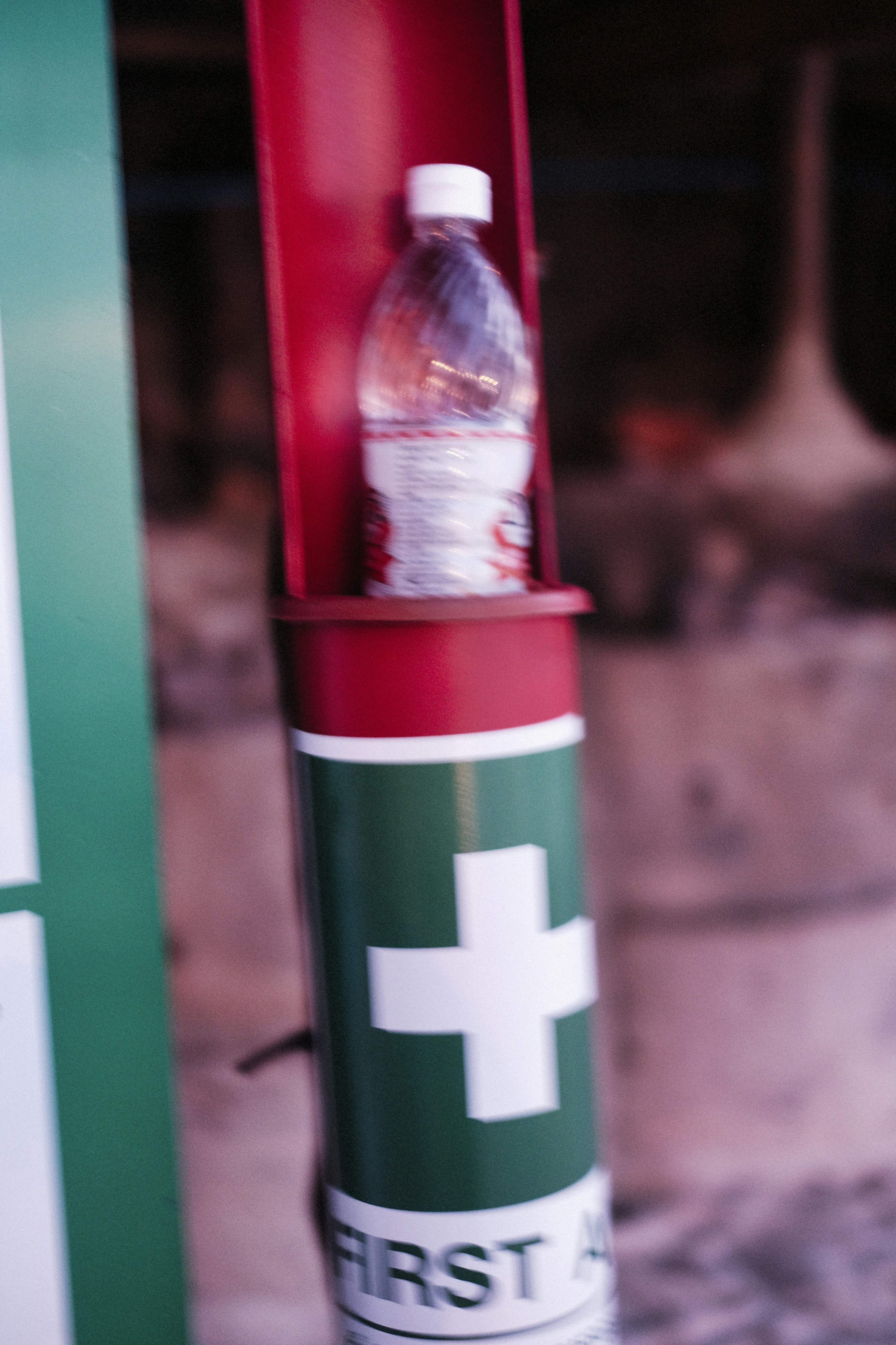 Water bottle sits inside a first aid kit.