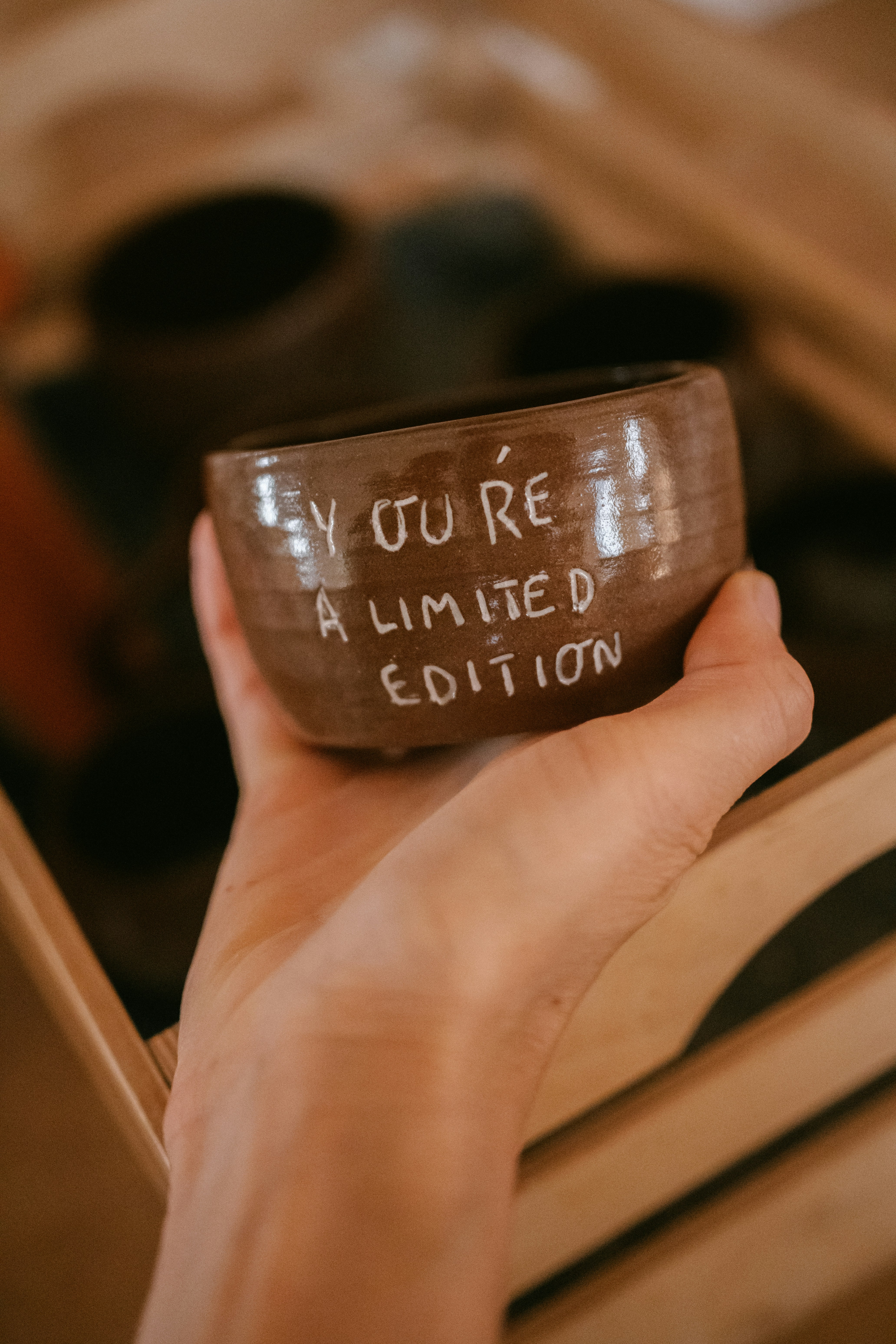 A hand holds a bowl saying, "you're a limited edition."