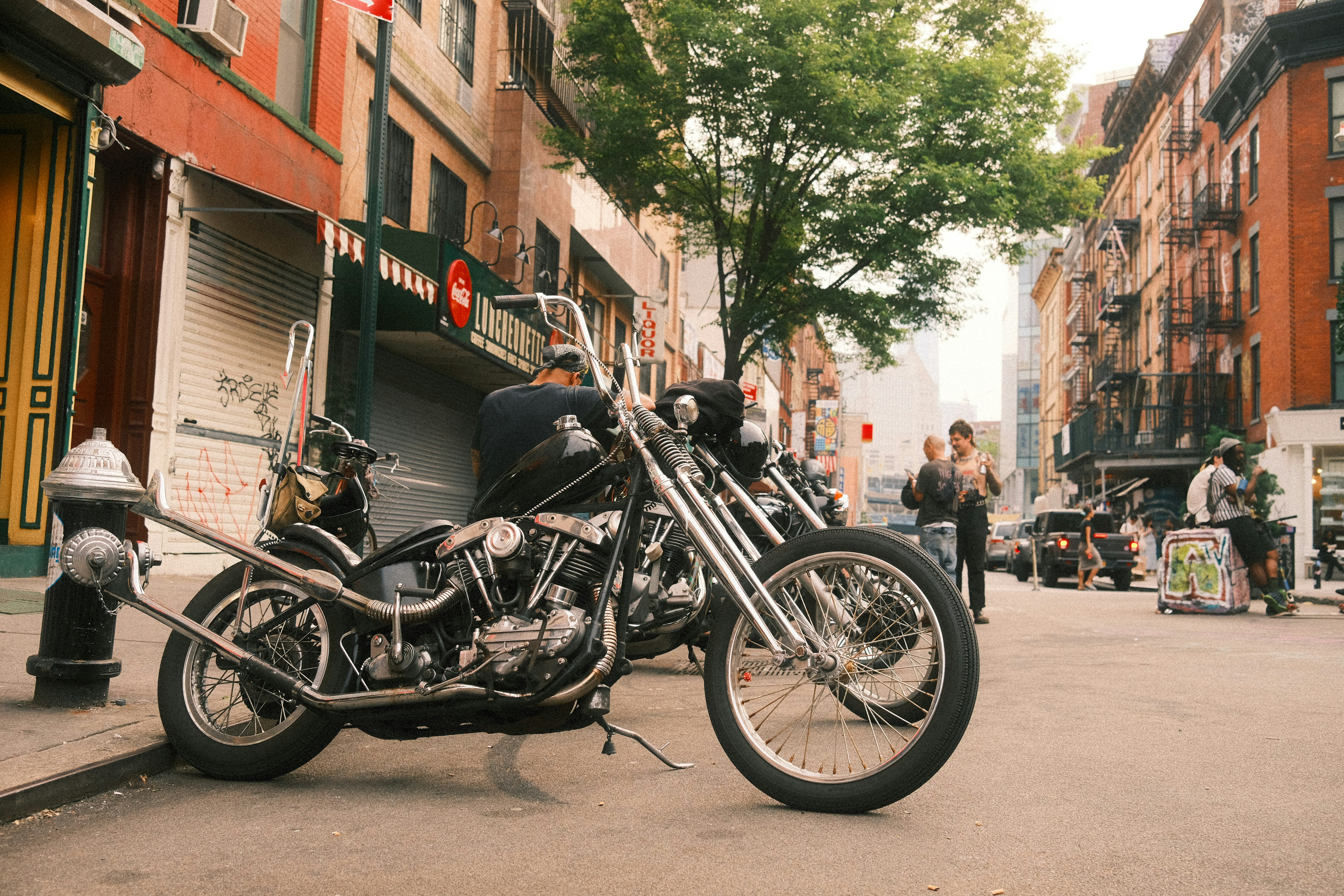 Urban Chrome at Street Level: A Cruiser Anchors a Quiet City Block